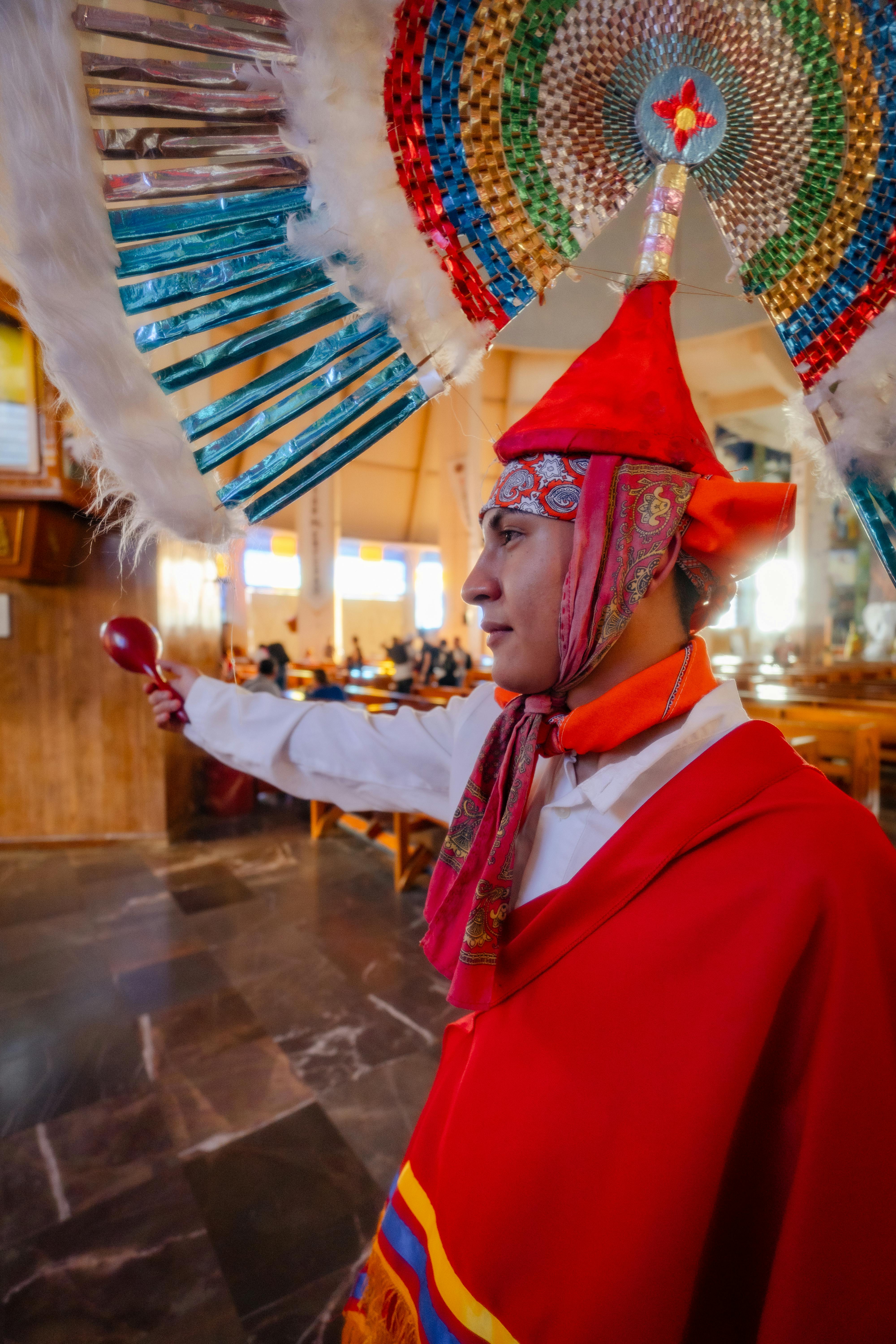 Man in Traditional Clothing and Plume · Free Stock Photo