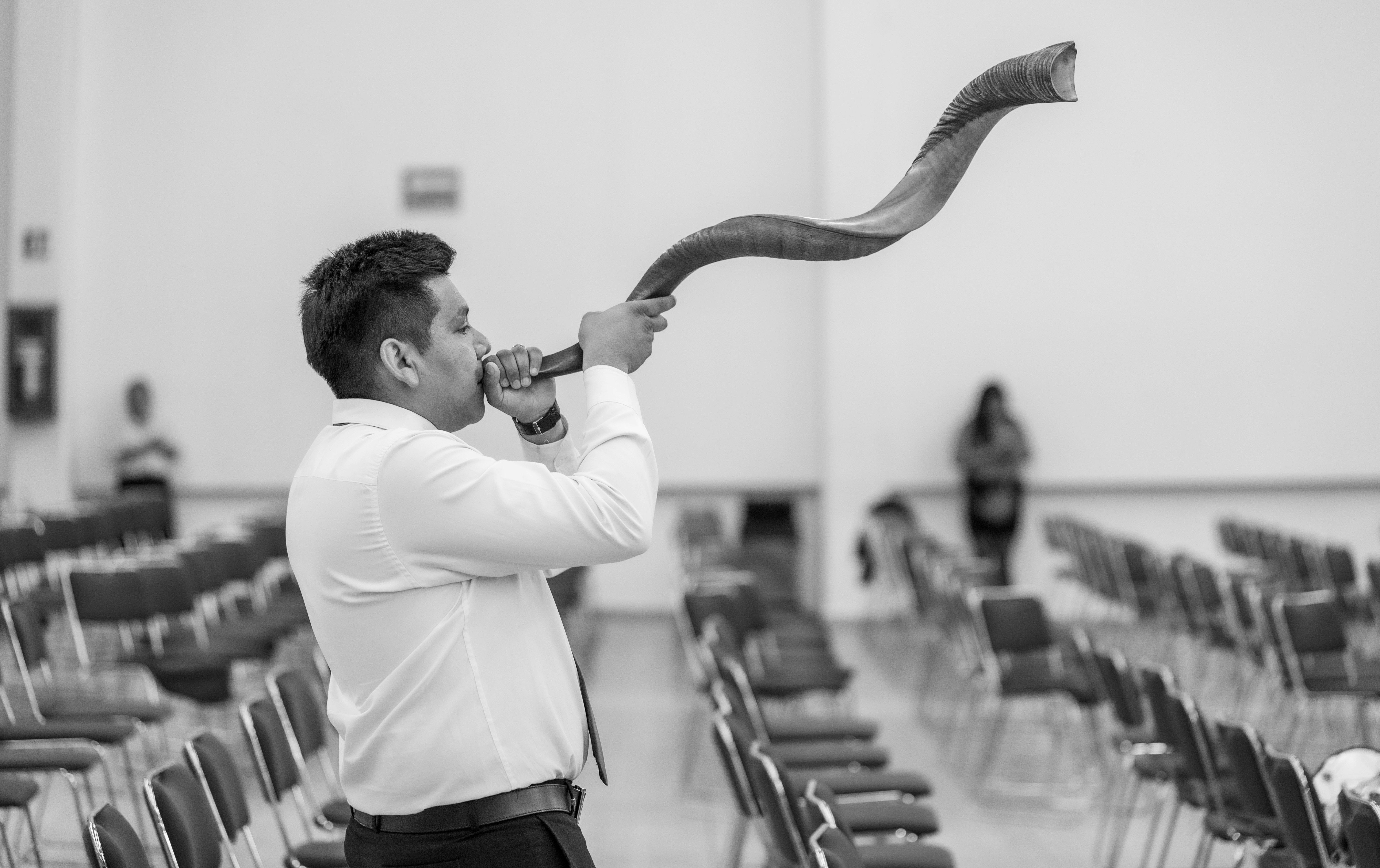Man Playing on Jewish Instrument in Black and White · Free Stock Photo
