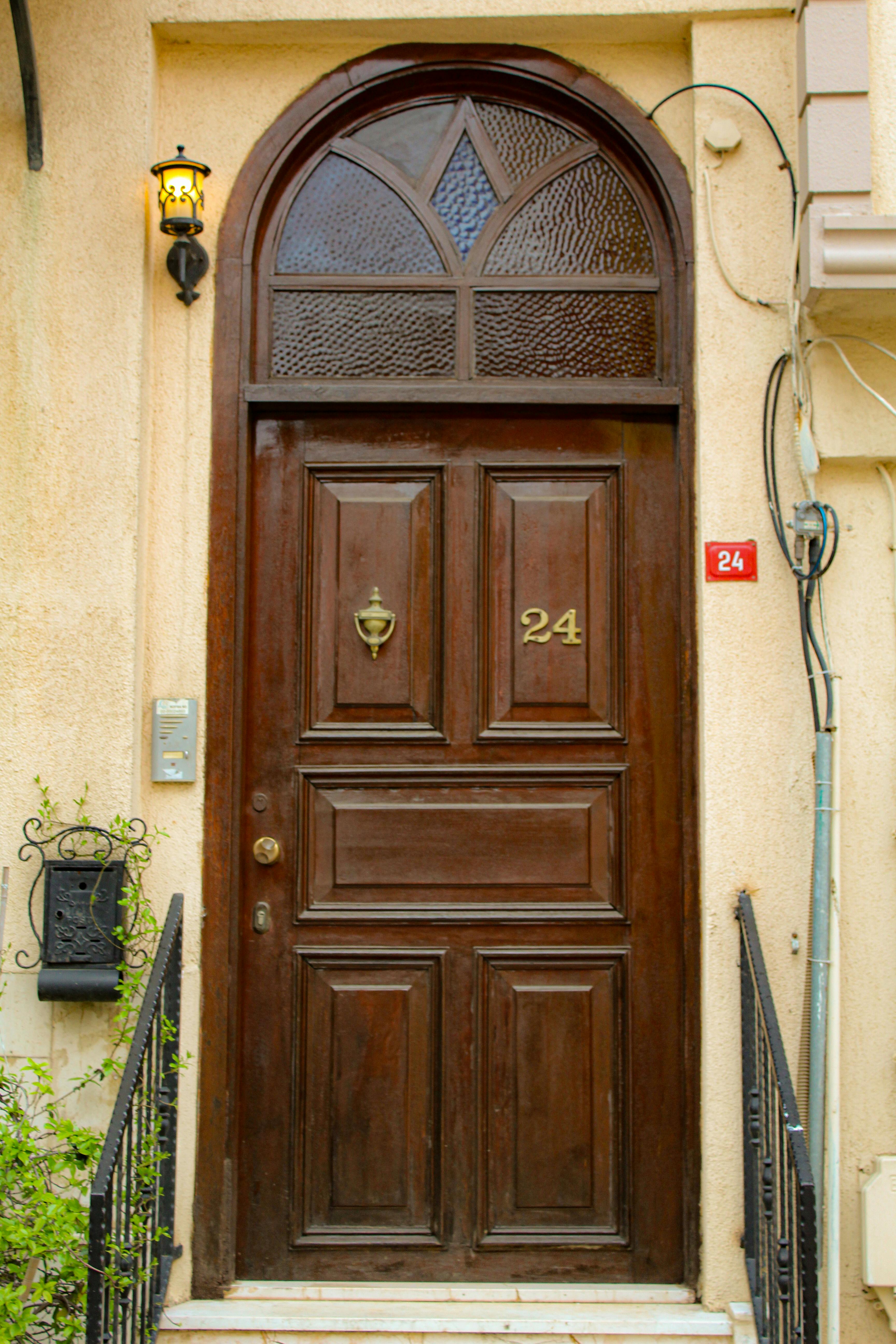 A wooden door with a number on it · Free Stock Photo