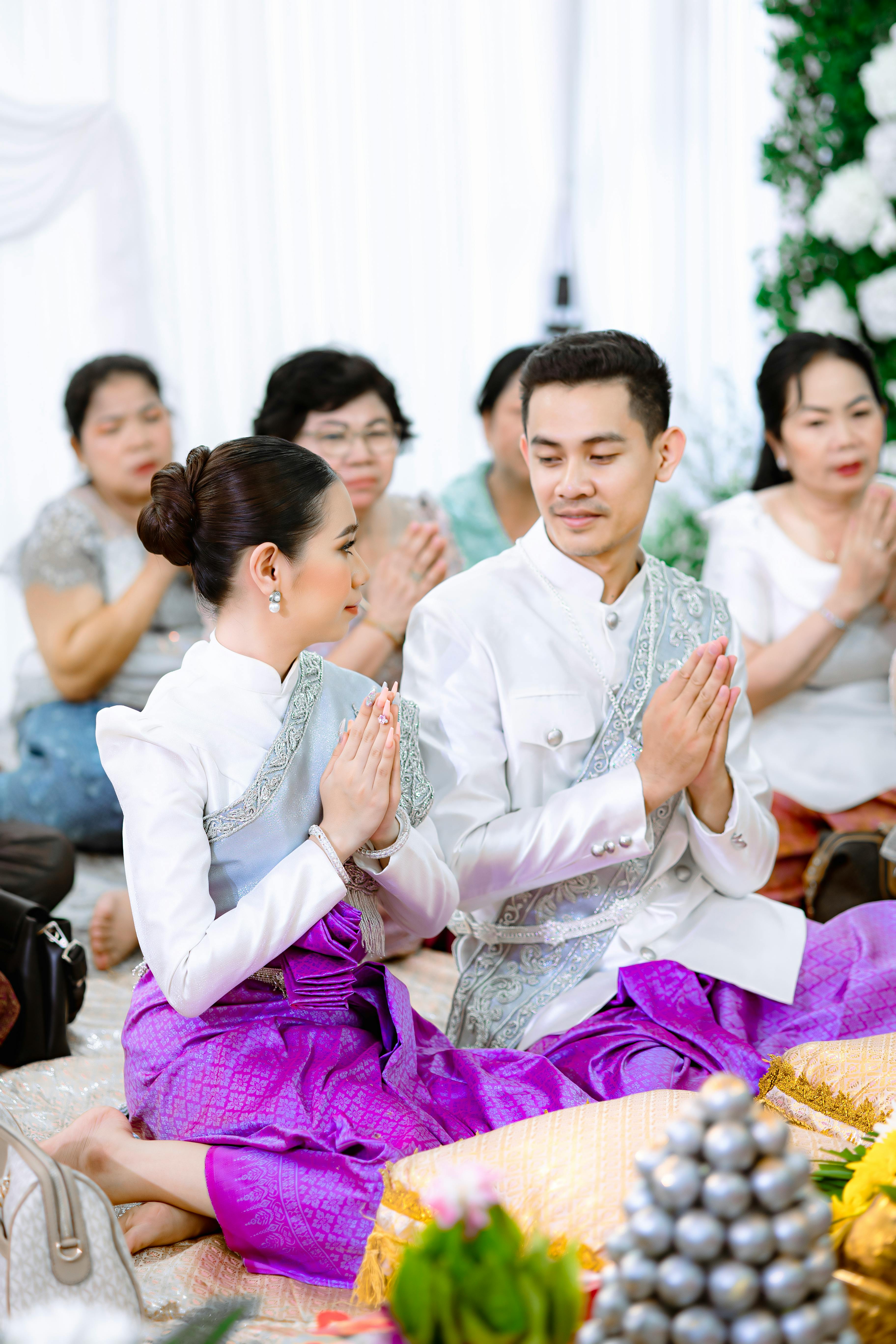 Bride and the Groom Praying during a Wedding Ceremony · Free Stock Photo