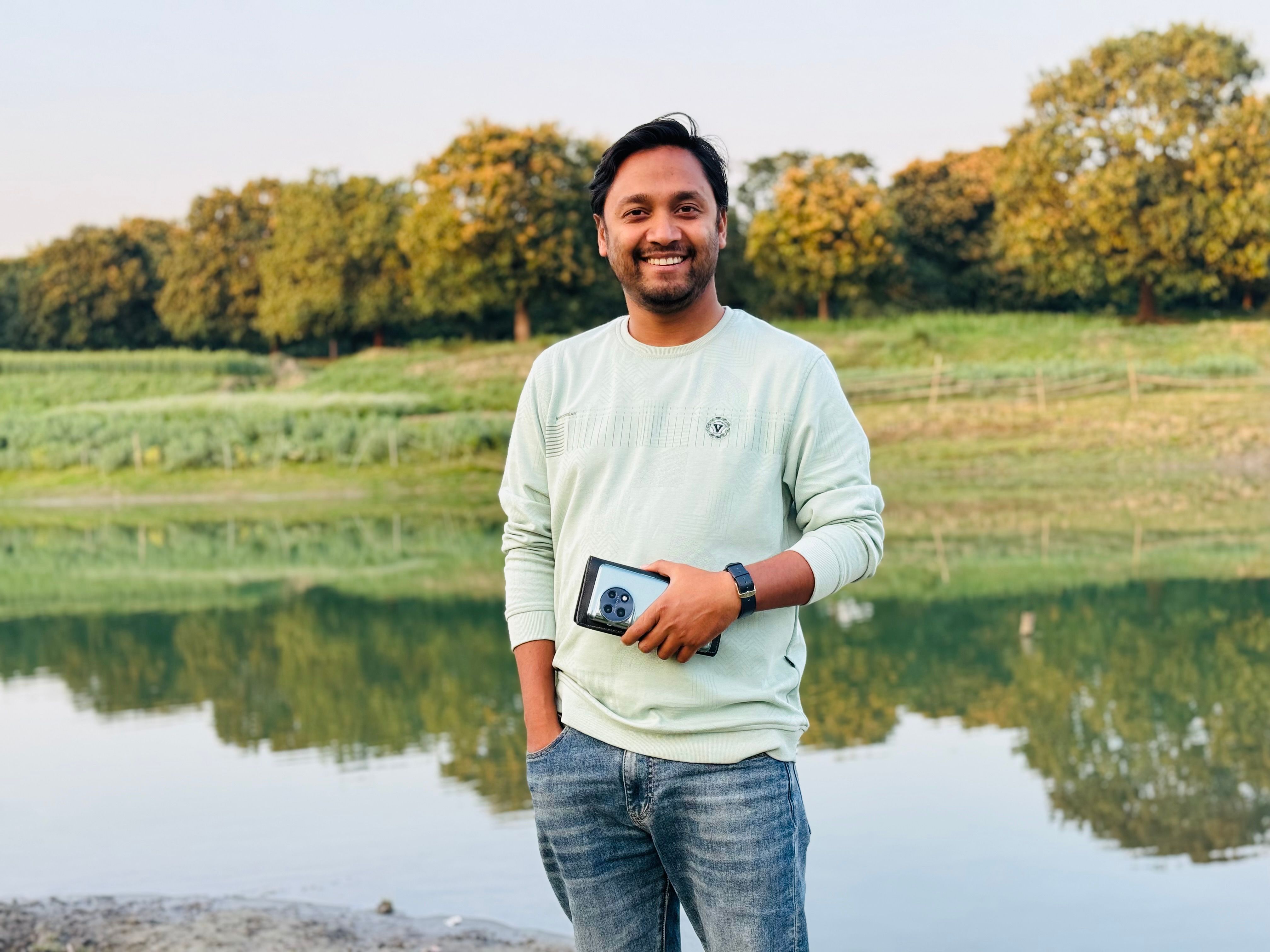 Photo of a Smiling Man, Posing by Pond in a Green Landscape · Free ...
