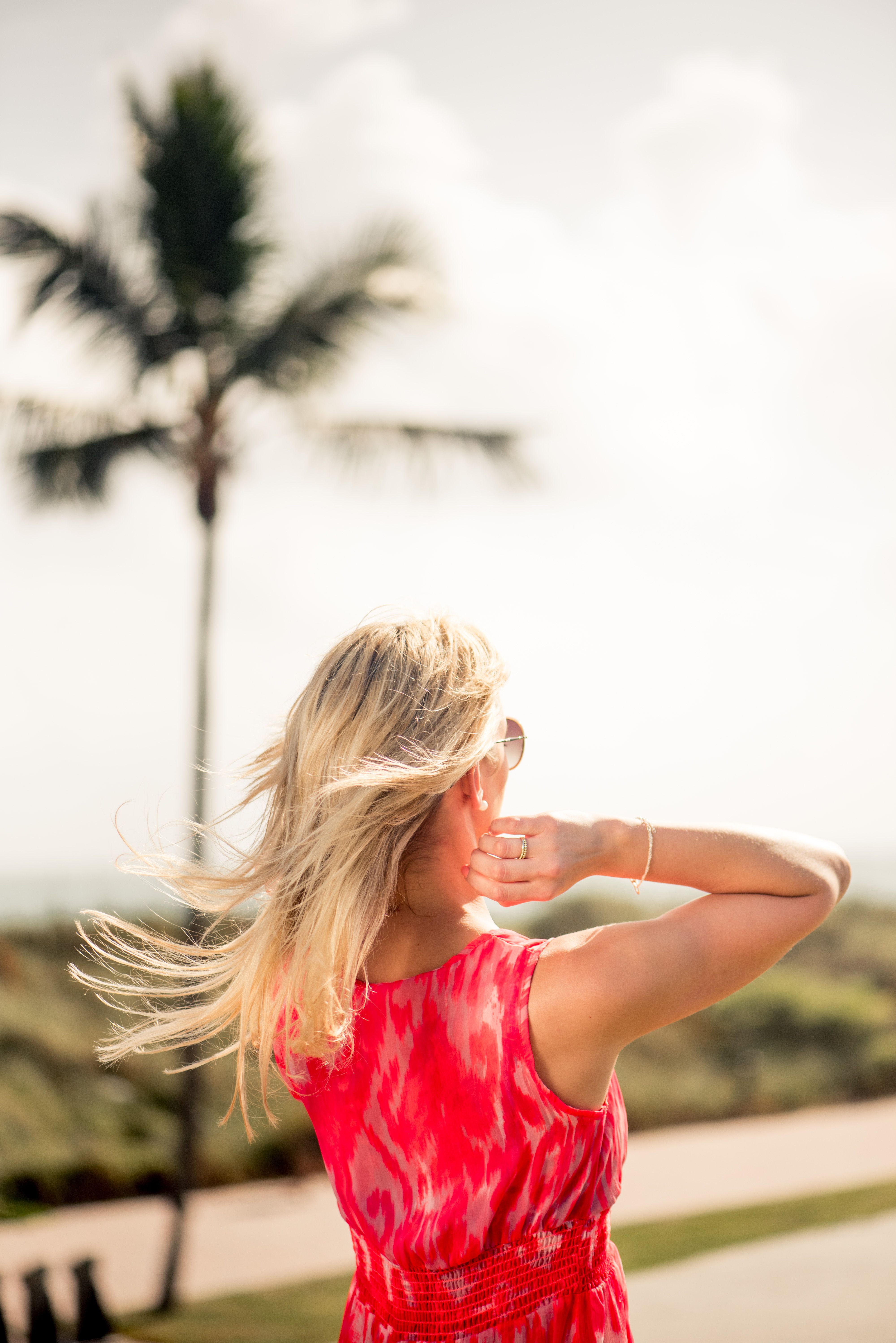 Back View Photo of Woman in Red Sleeveless Top · Free Stock Photo