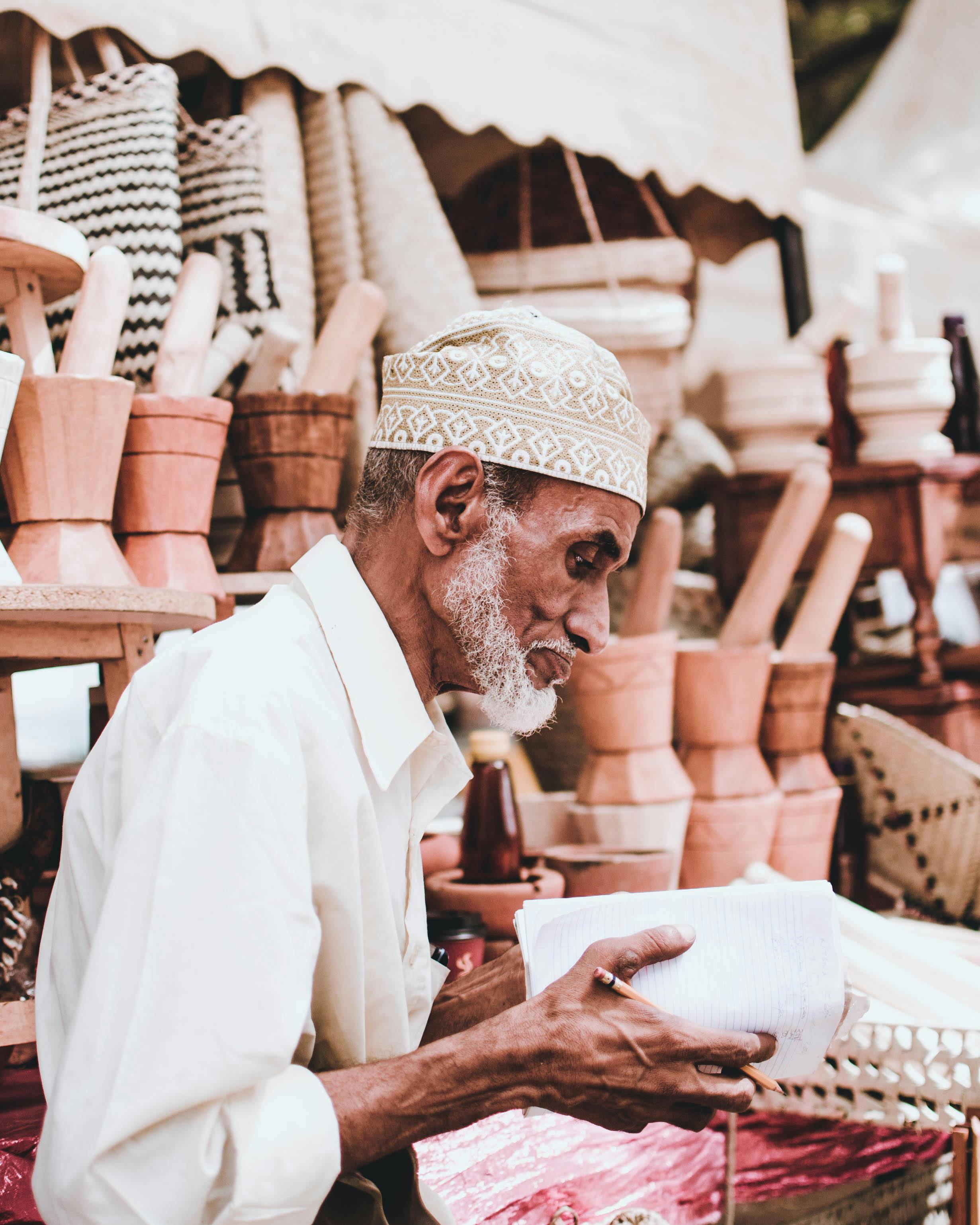 Person Selling Handicrafts · Free Stock Photo