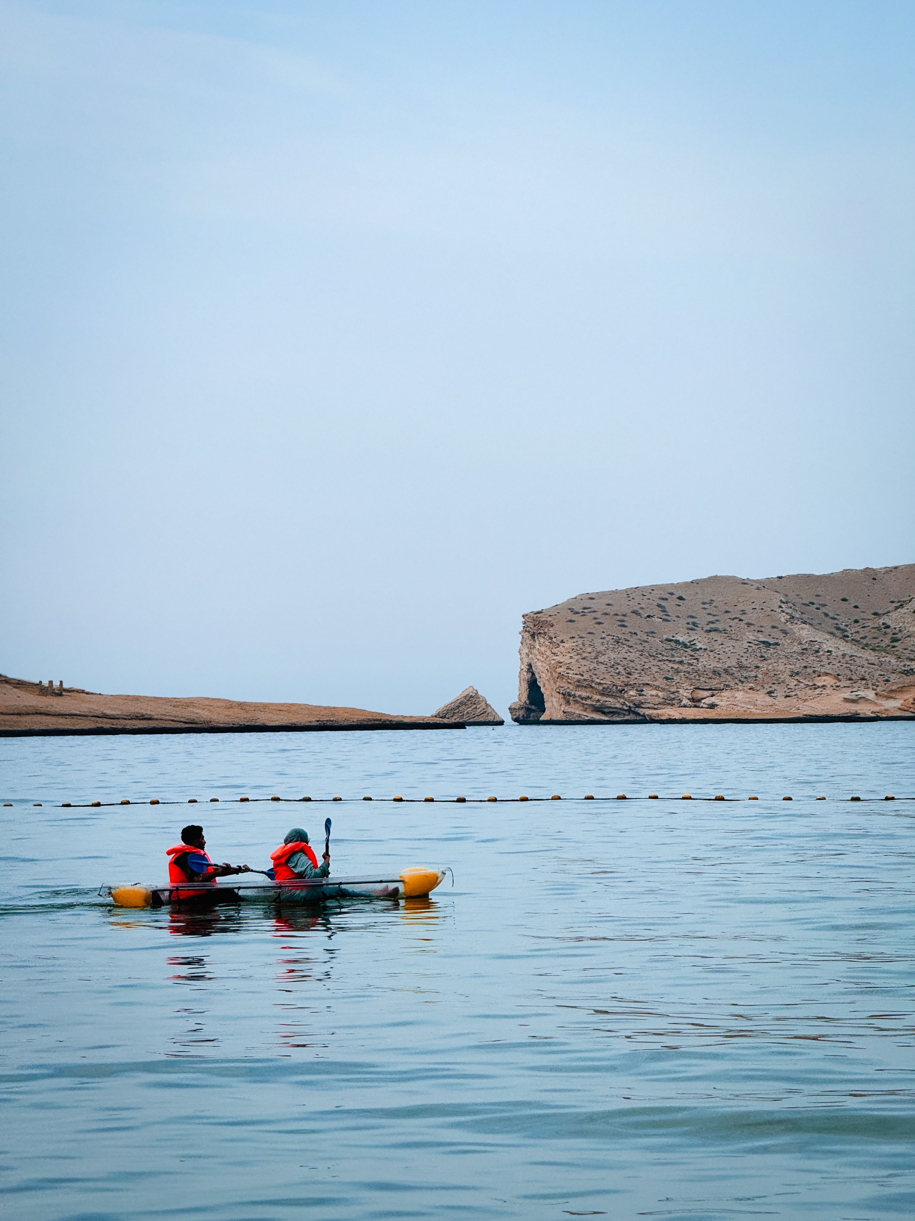 People Kayaking on Seashore in Oman · Free Stock Photo