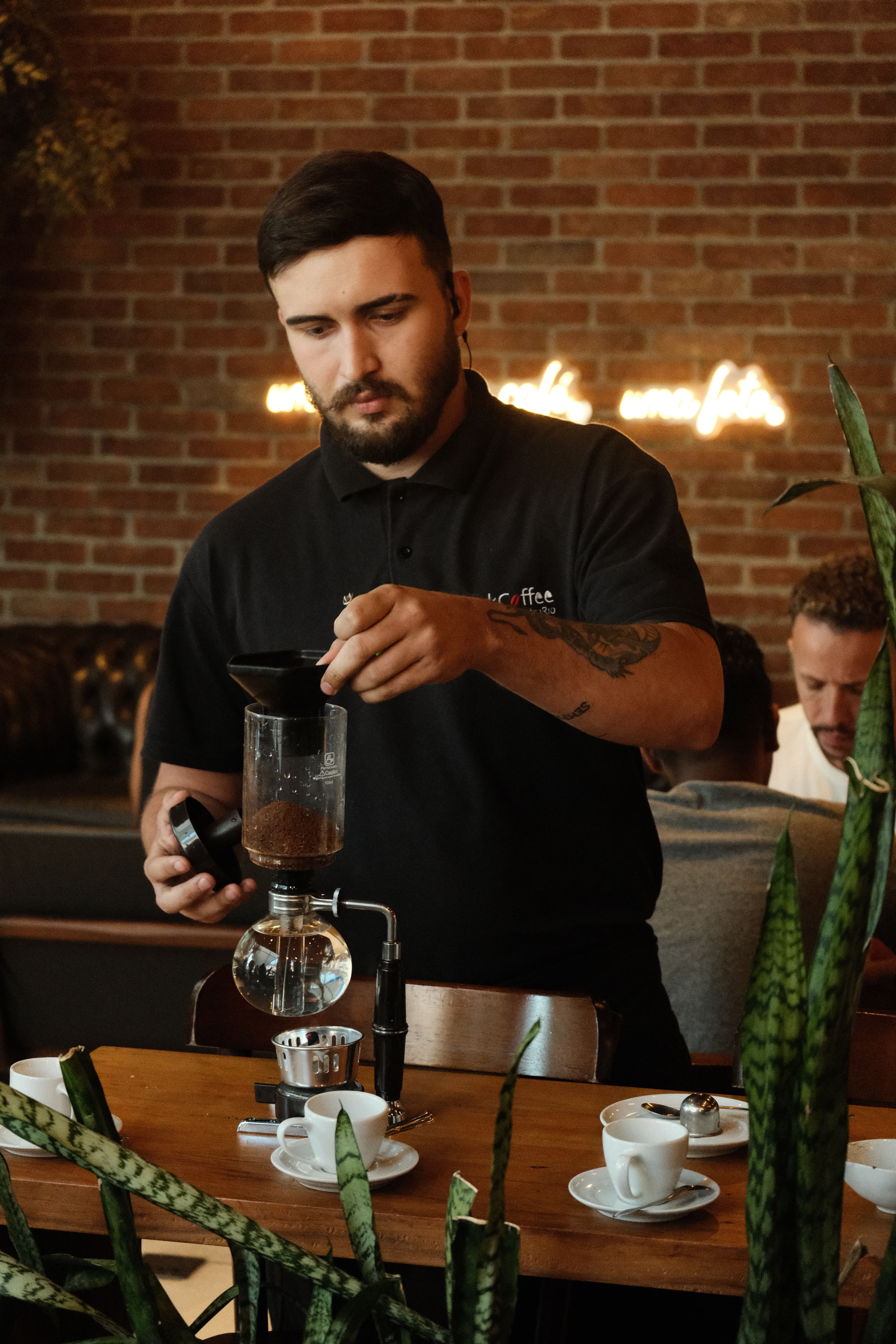 Bearded Barista Preparing Drip Coffee in Cafe · Free Stock Photo