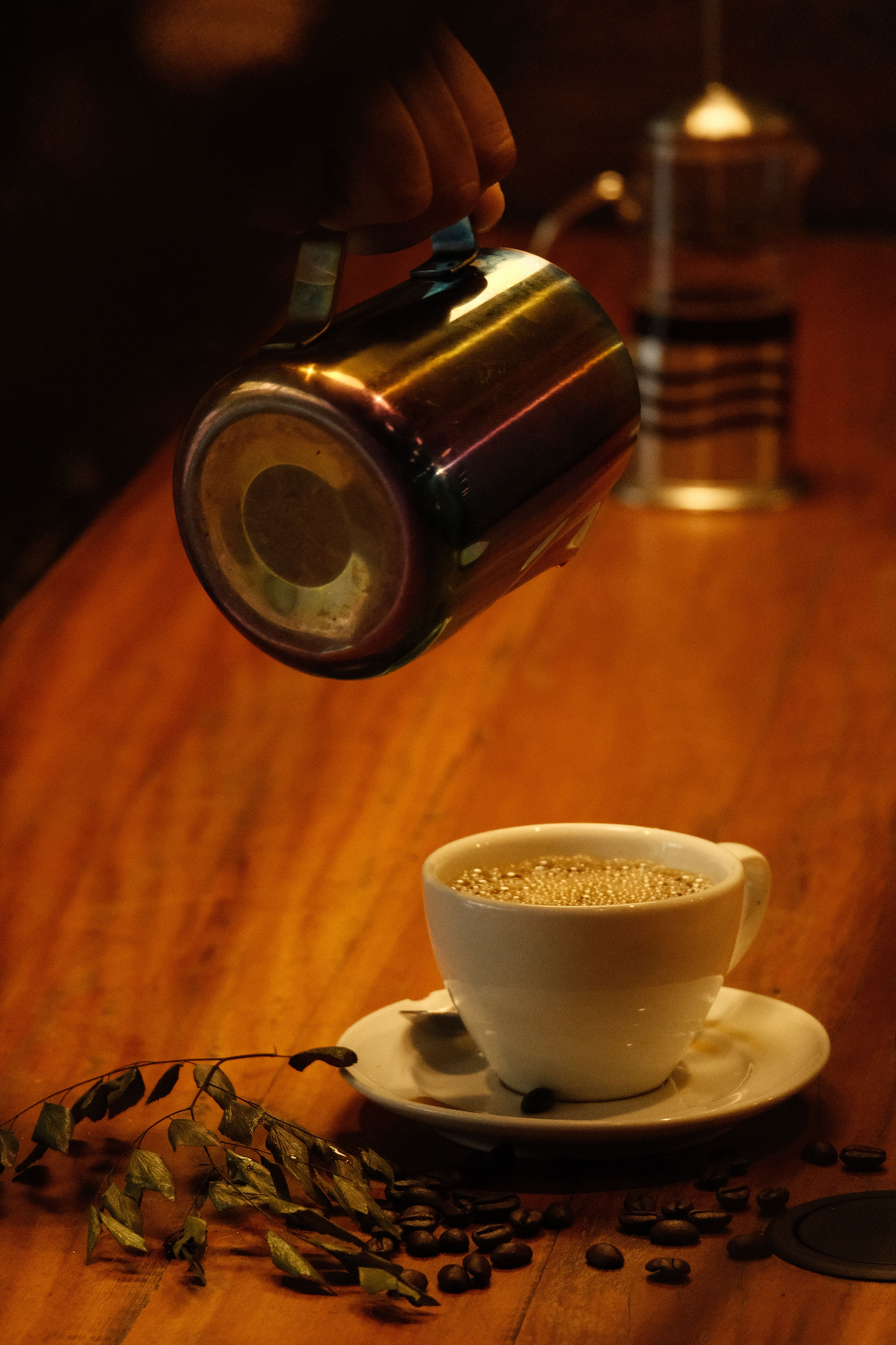 Pouring Coffee in Cafe · Free Stock Photo