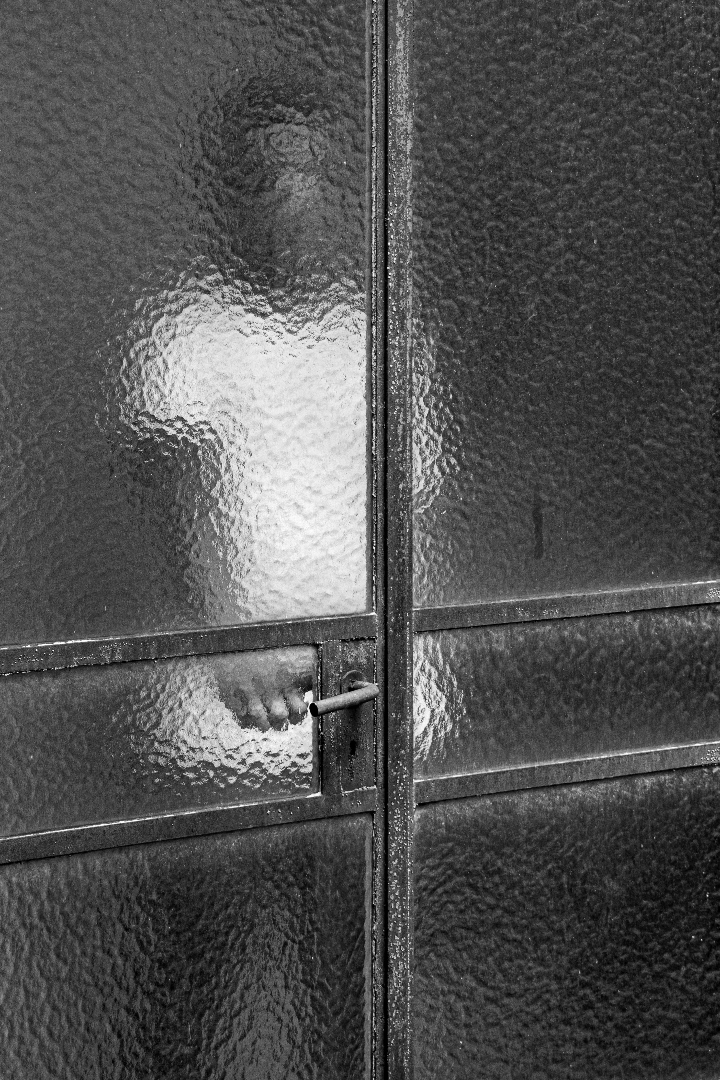 Person behind Glass Door · Free Stock Photo