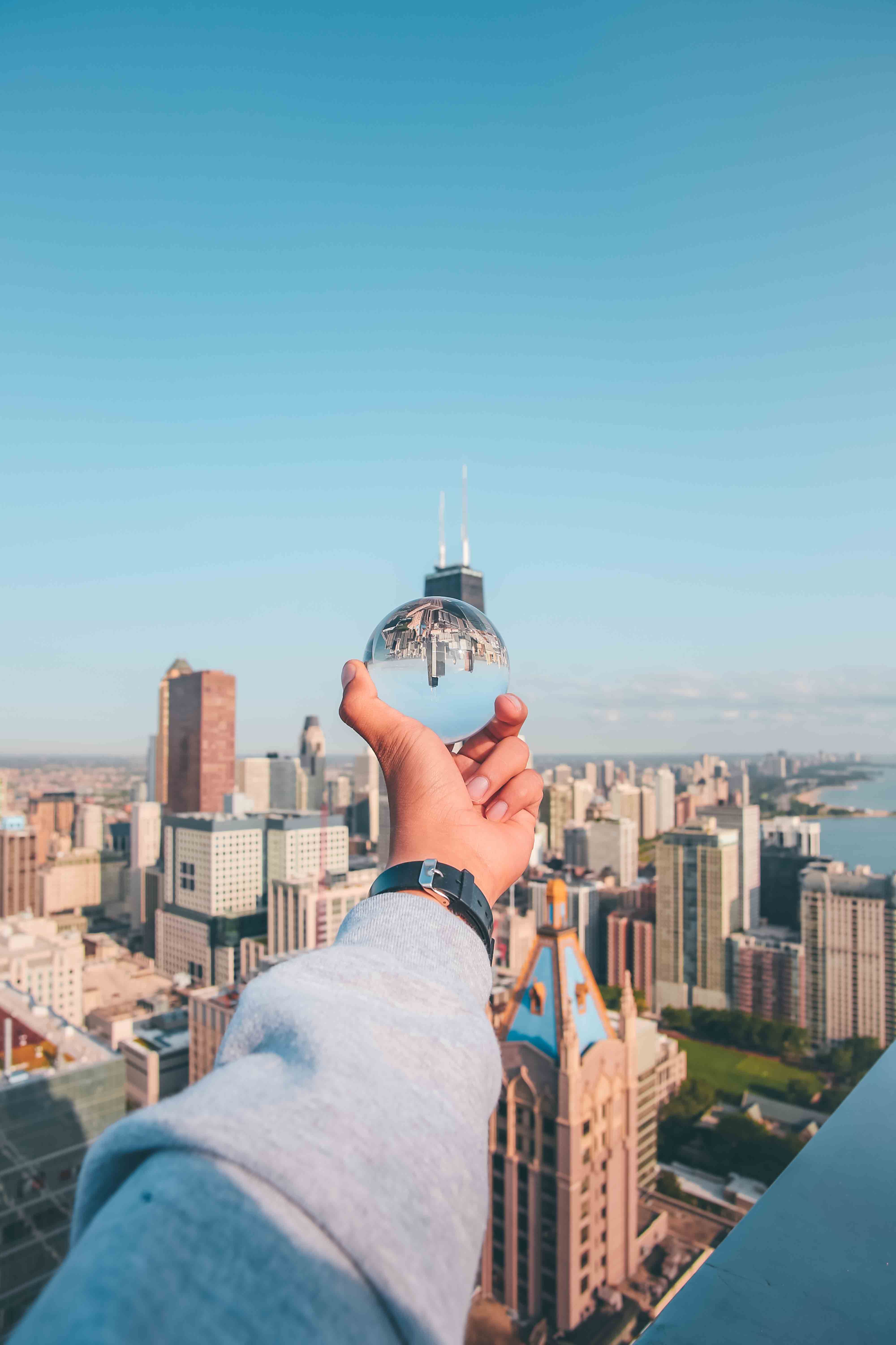Person Holding Clear Ball · Free Stock Photo