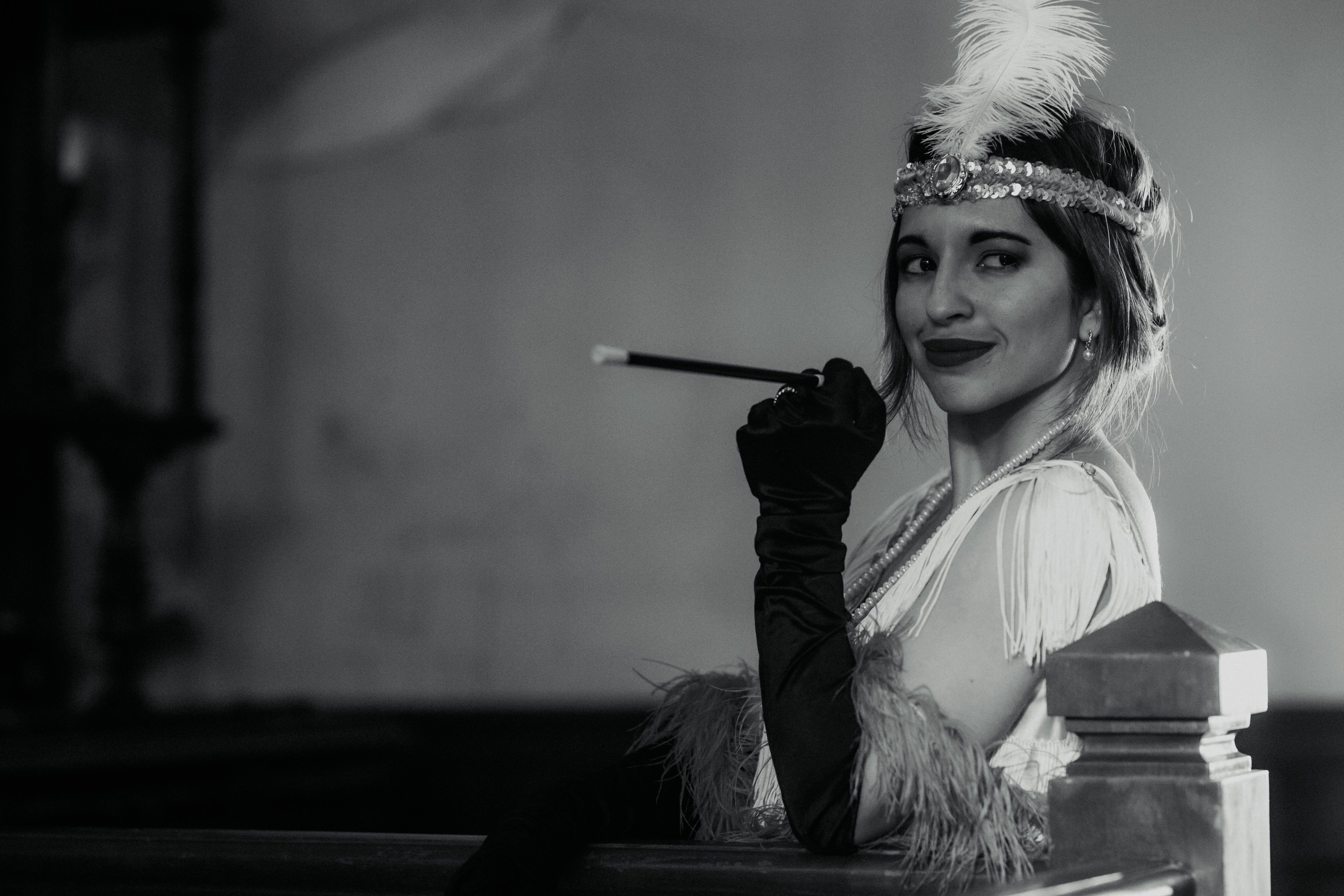 Burlesque Dancer in Headdress with Feather · Free Stock Photo