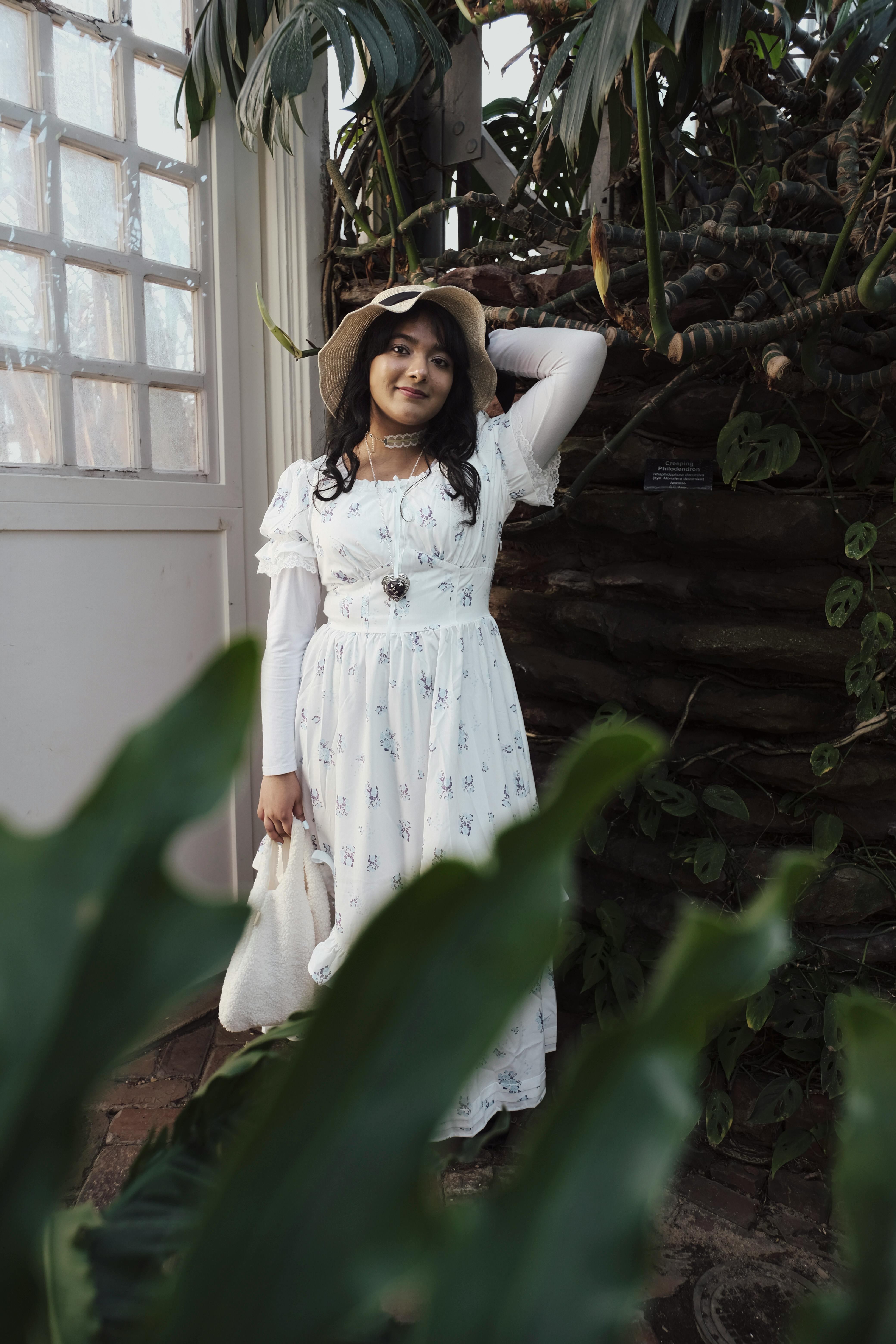 Cottage Core Woman in greenhouse · Free Stock Photo