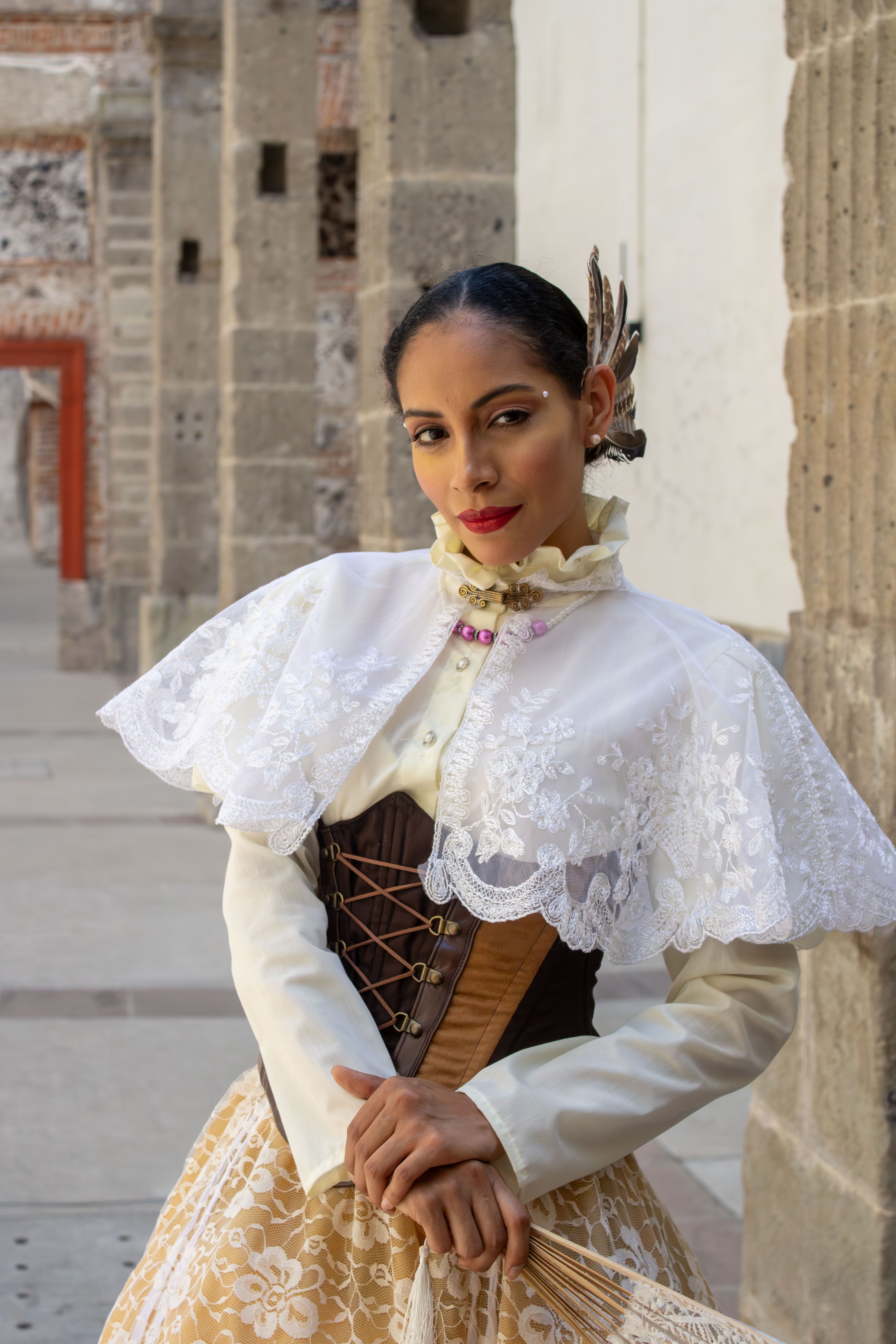 Brunette Woman with Feathers behind Ear Wearing Traditional Dress ...