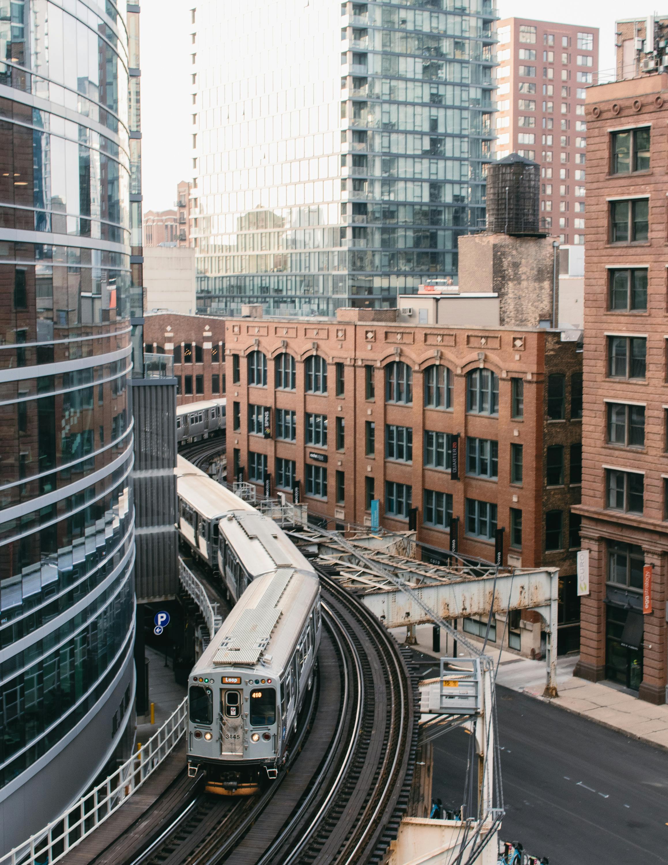 Train Near Buildings · Free Stock Photo