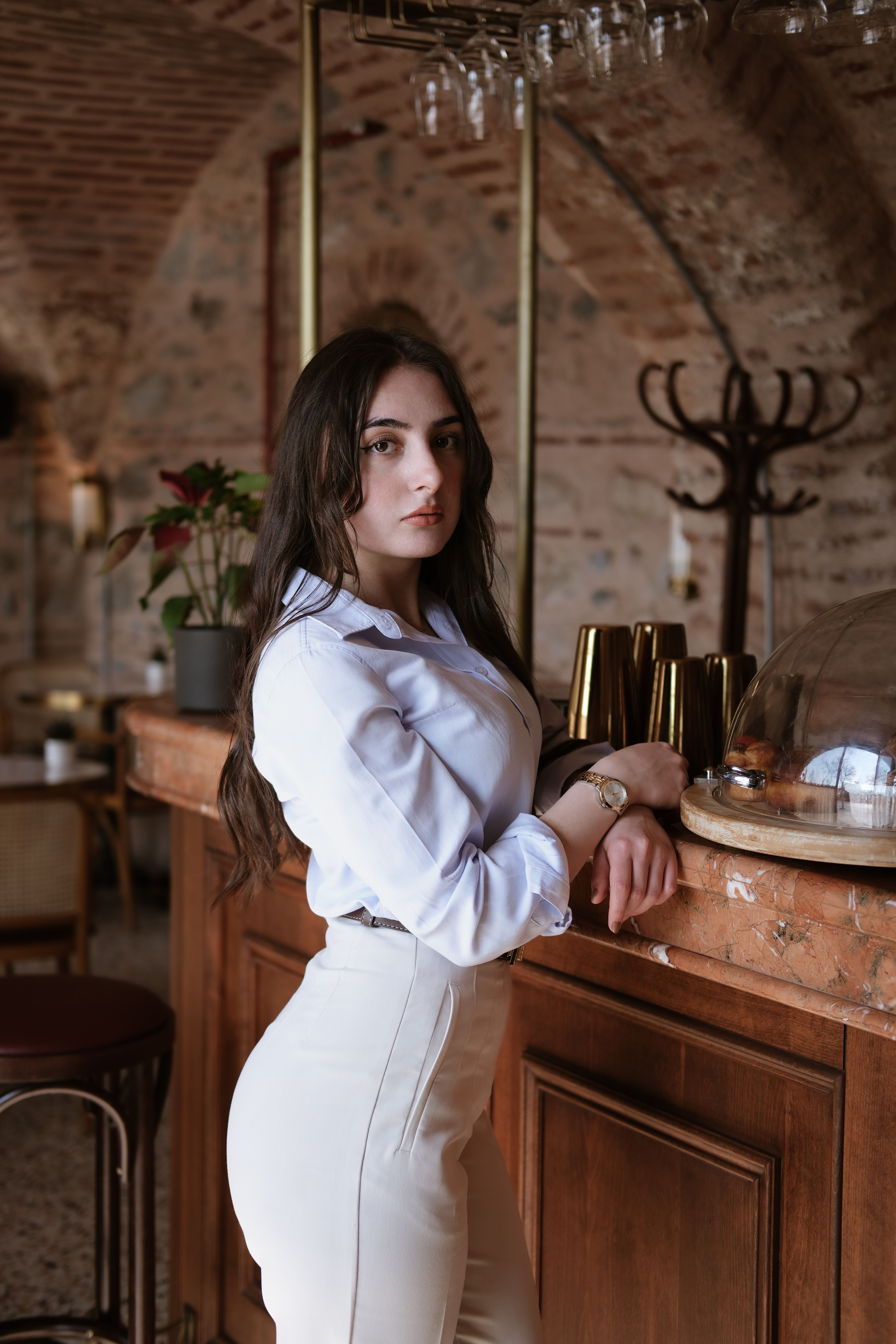 Portrait of a Woman Standing at a Bar · Free Stock Photo