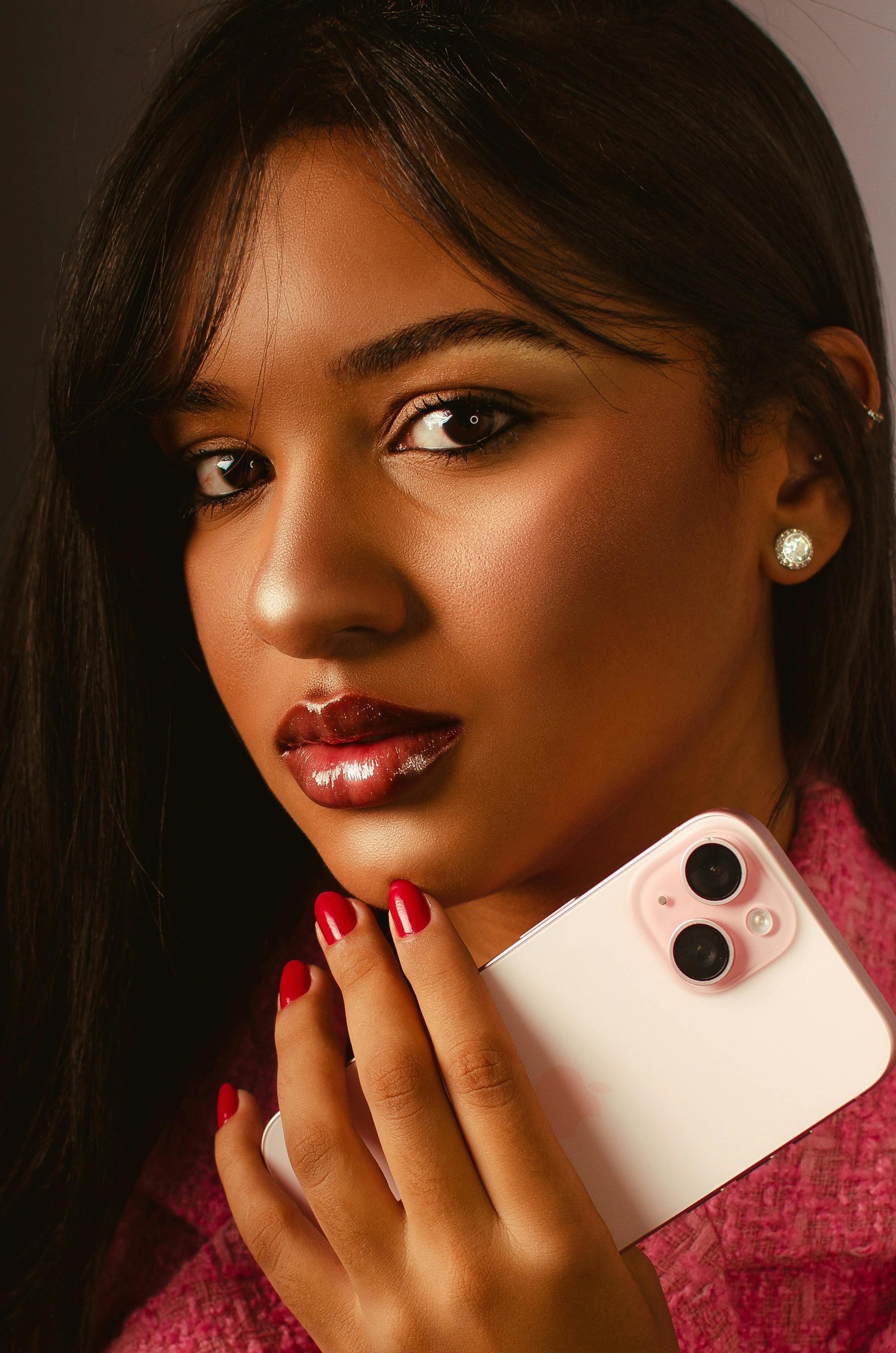 Gorgeous Woman with Iphone in Hand · Free Stock Photo