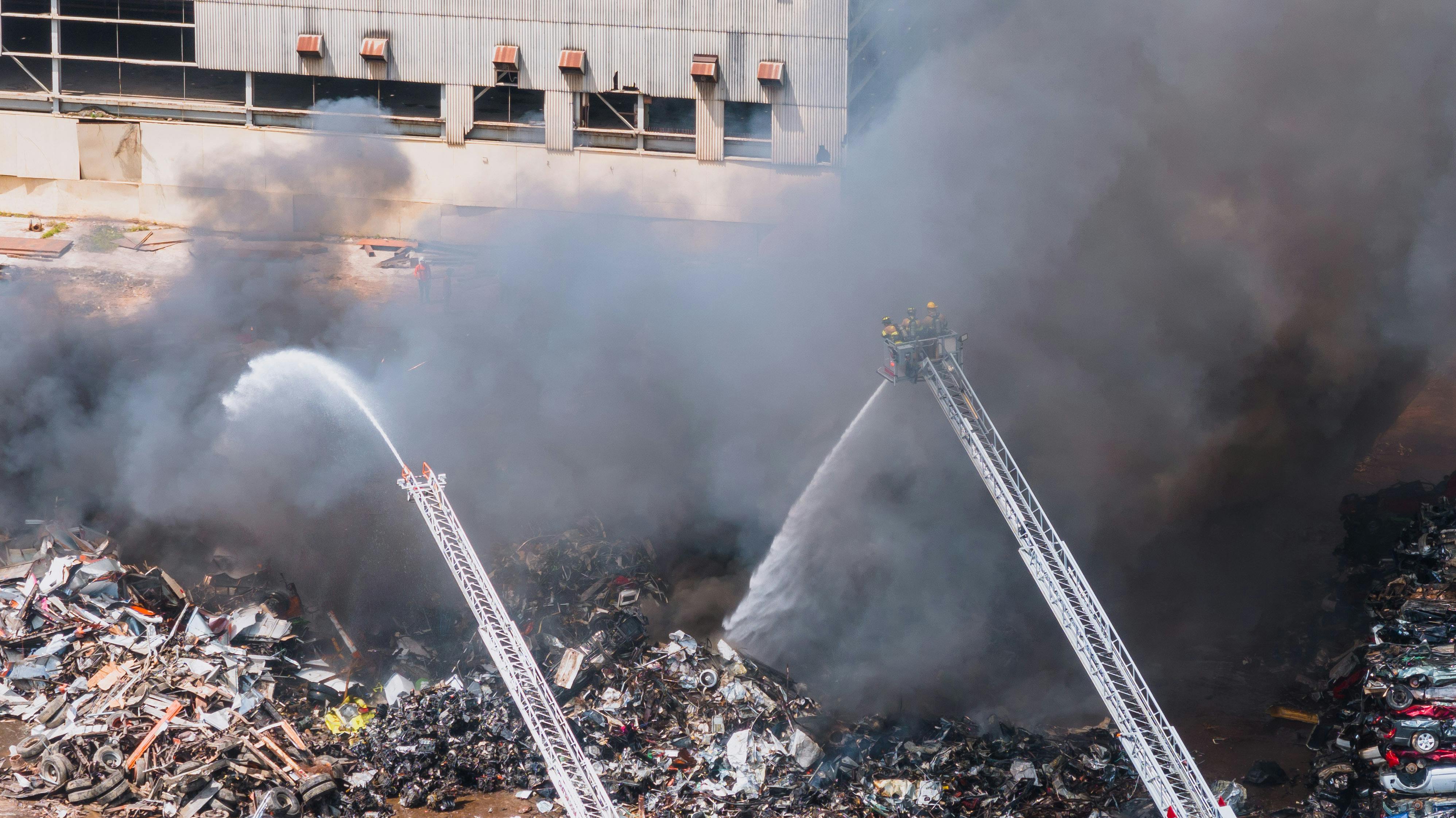 Extinguishing Garbage on Fire · Free Stock Photo