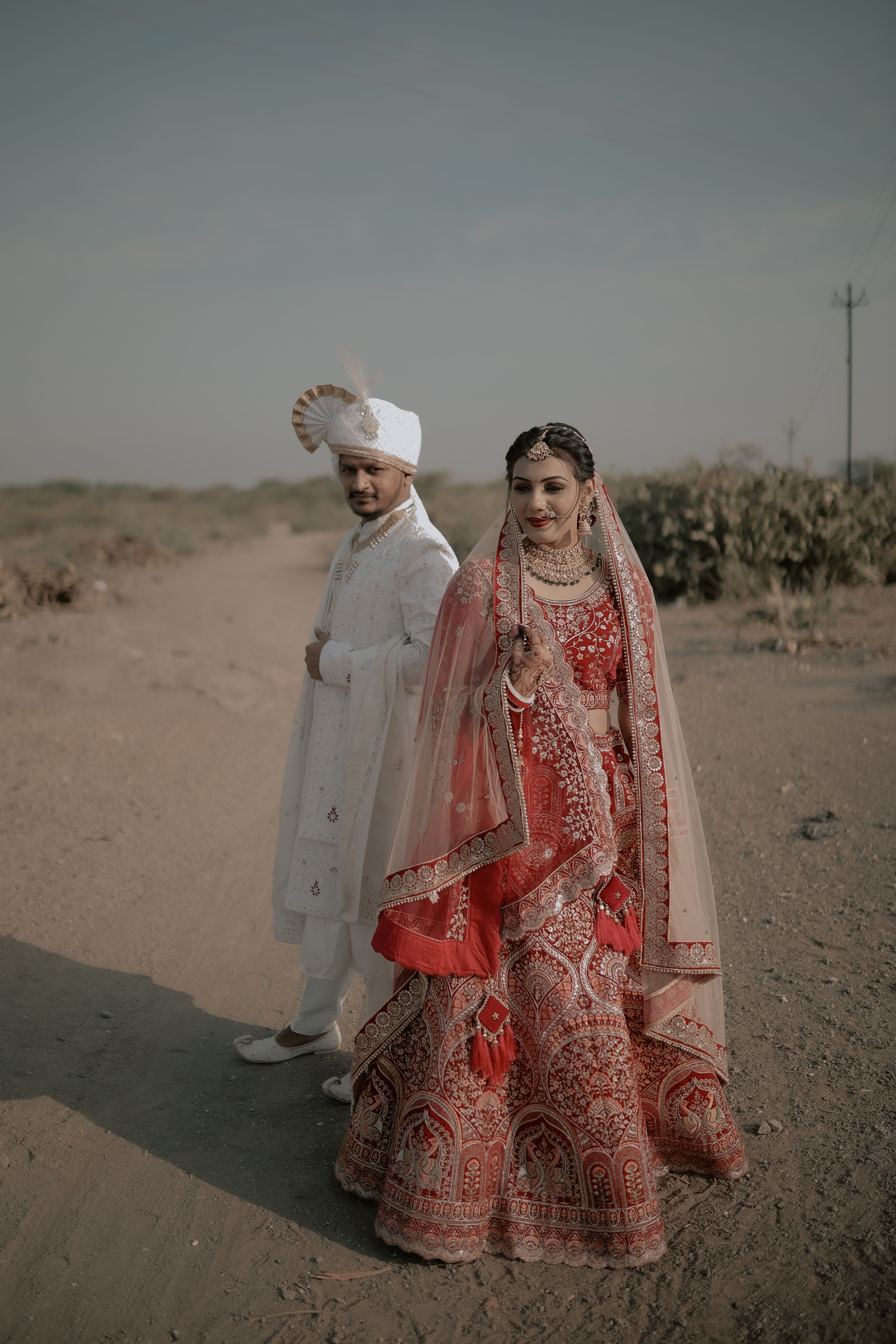 Photo of the Bride and Groom Wearing Traditional Clothing · Free Stock ...