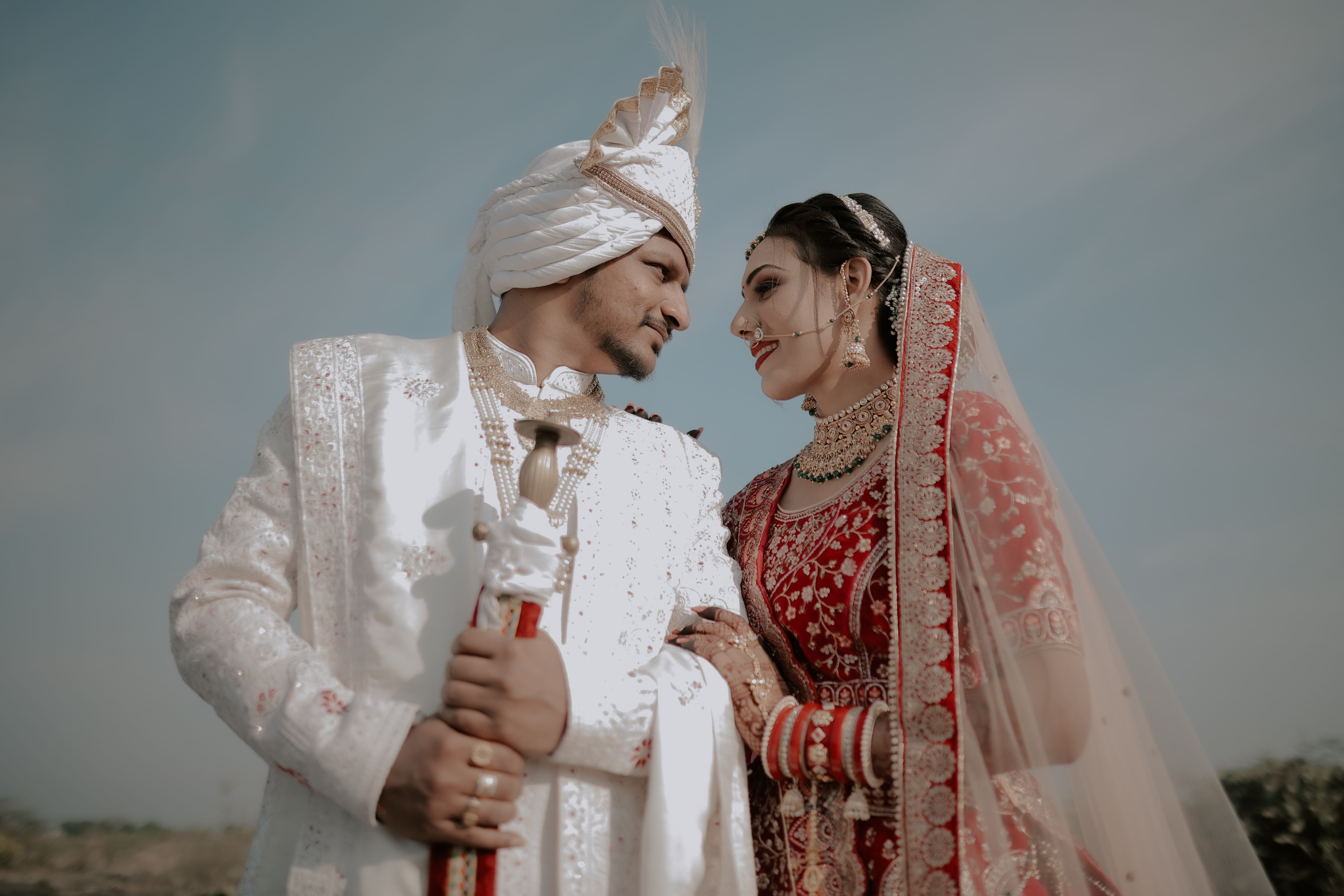 Photo of the Bride and Groom Wearing Traditional Clothing · Free Stock ...
