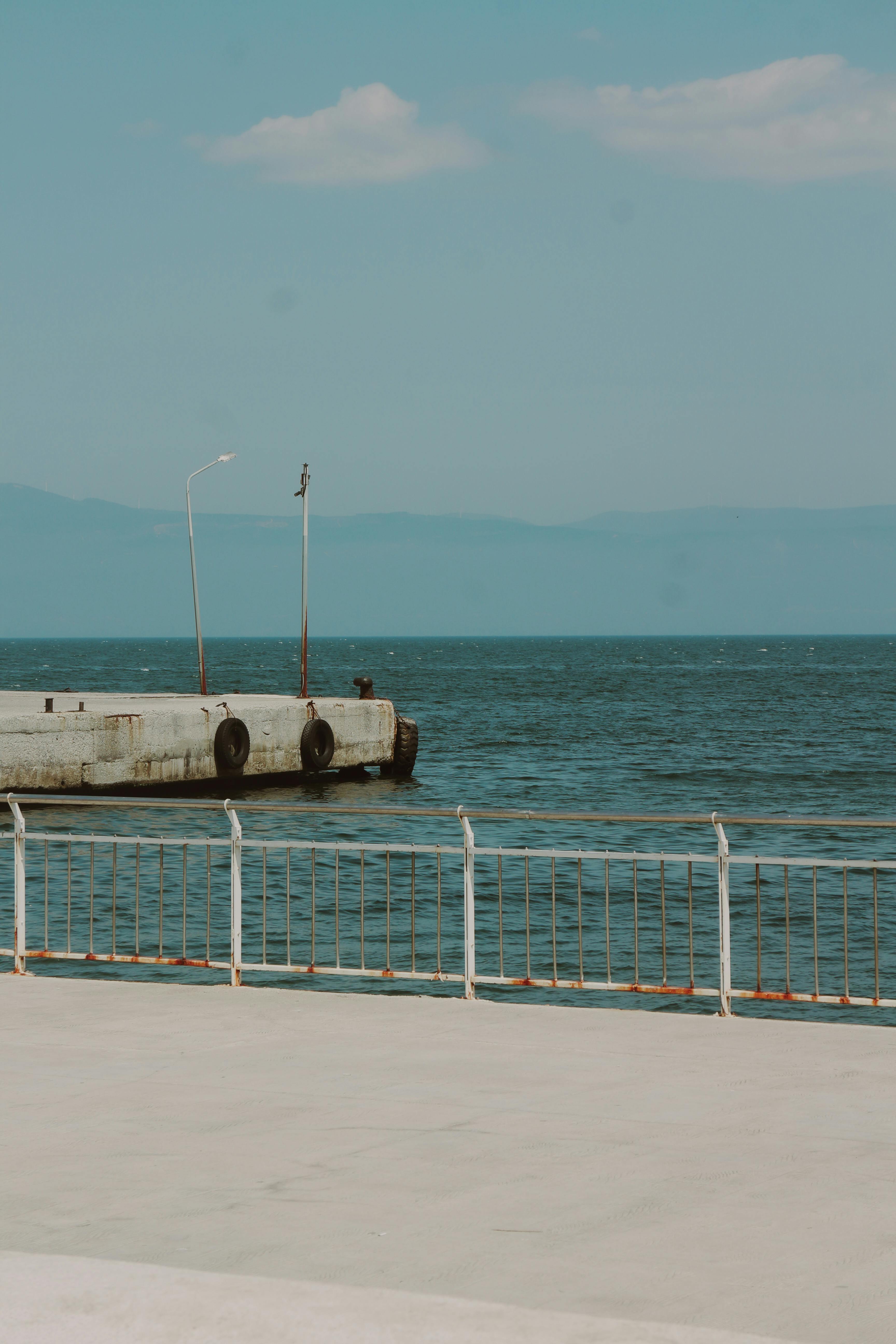 Railing on Promenade on Seashore · Free Stock Photo
