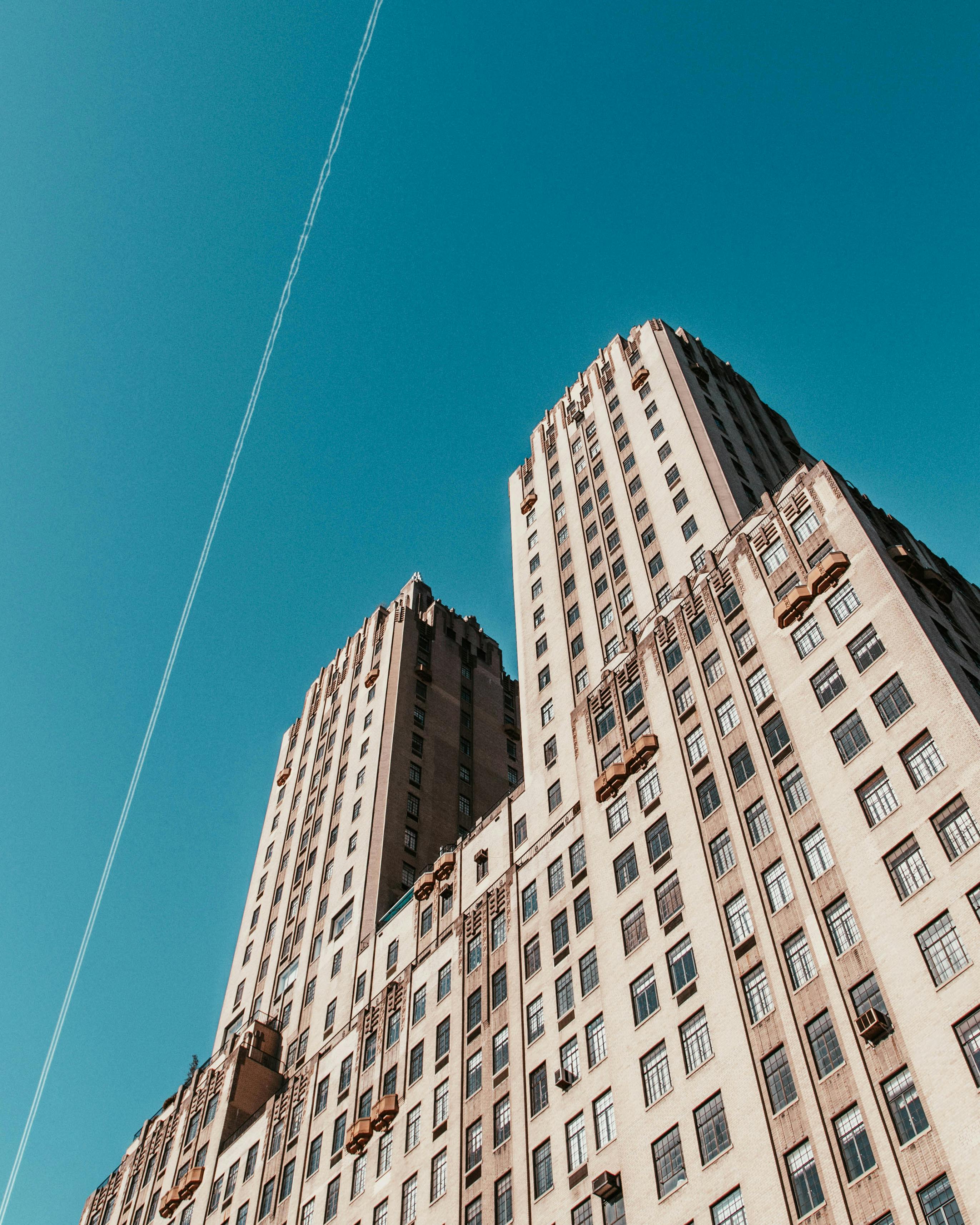Low Angle View Photography of Gray Building · Free Stock Photo