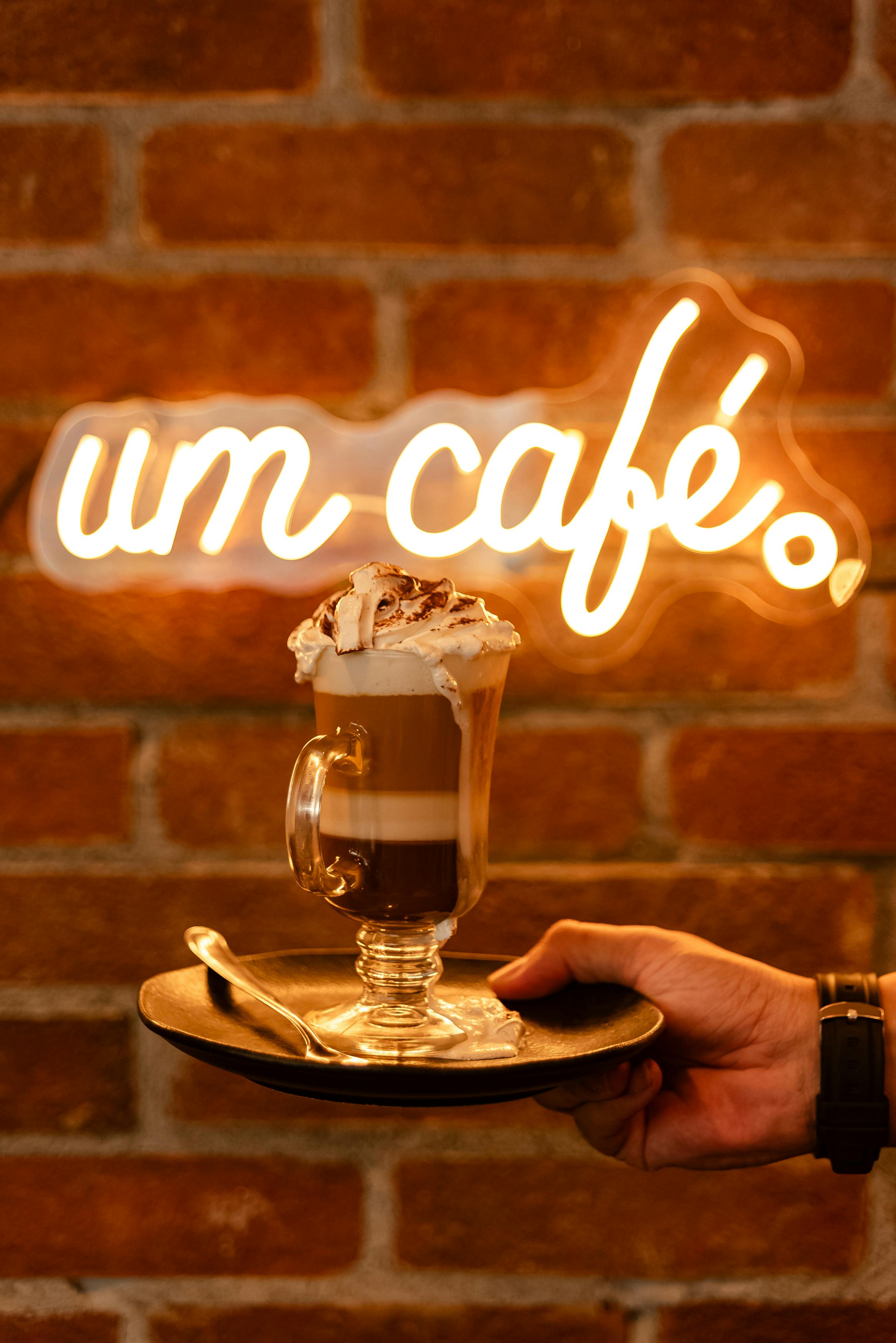 Free A creamy iced coffee served in Rio de Janeiro café with neon sign ...