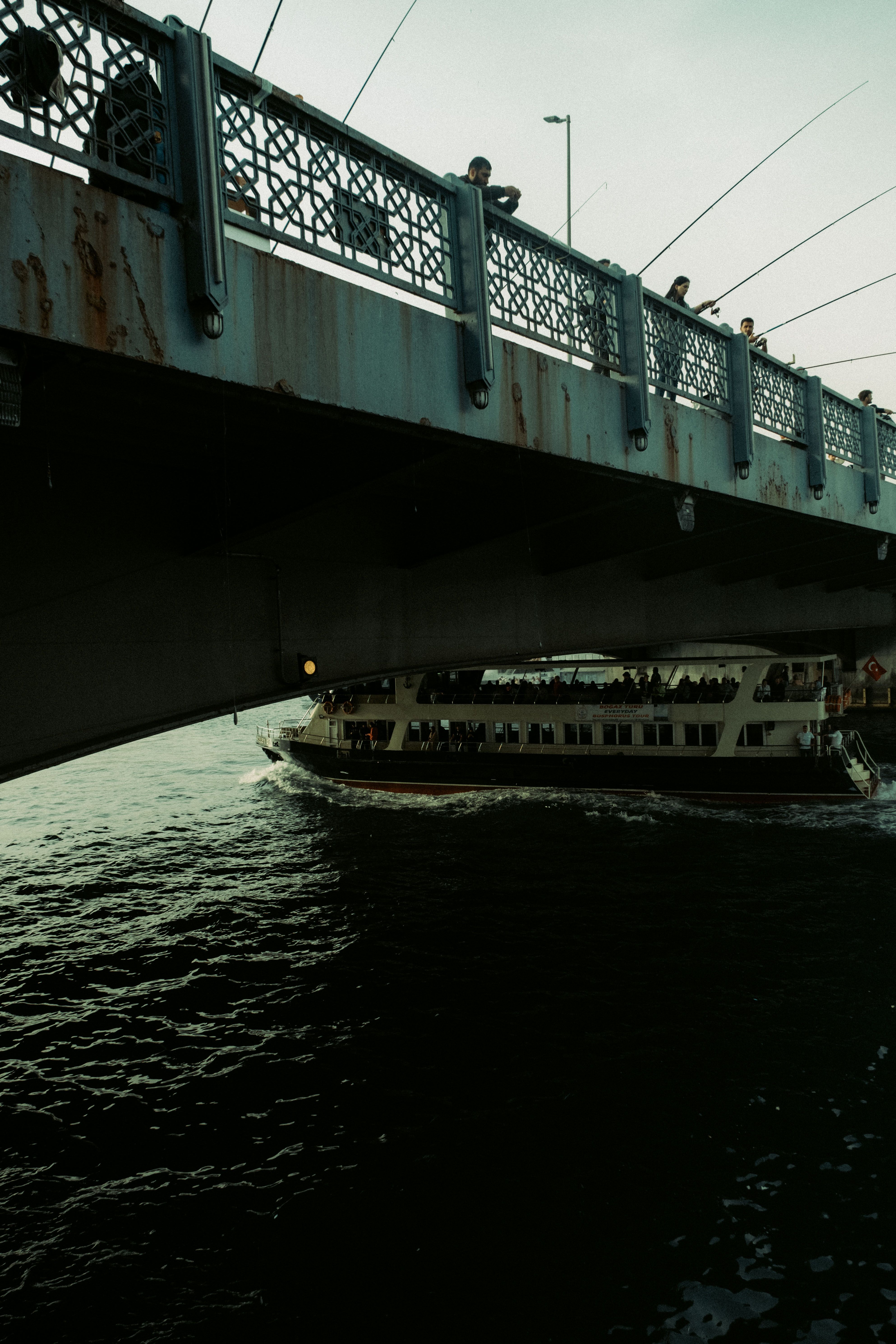 Ferry Under Galata Bridge in Istanbul, Turkey · Free Stock Photo