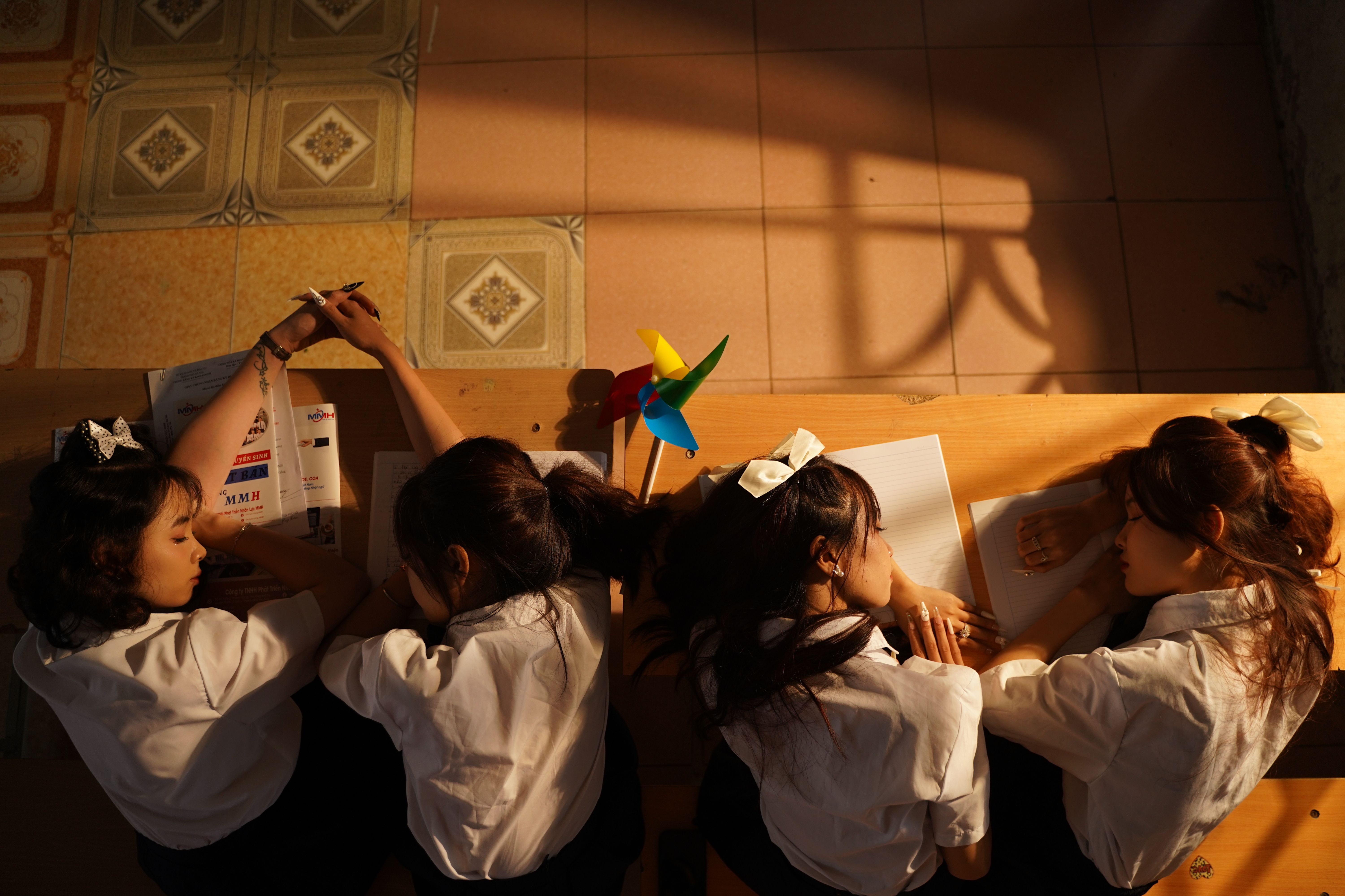 Schoolgirls Lying Down on Tables and Sleeping · Free Stock Photo