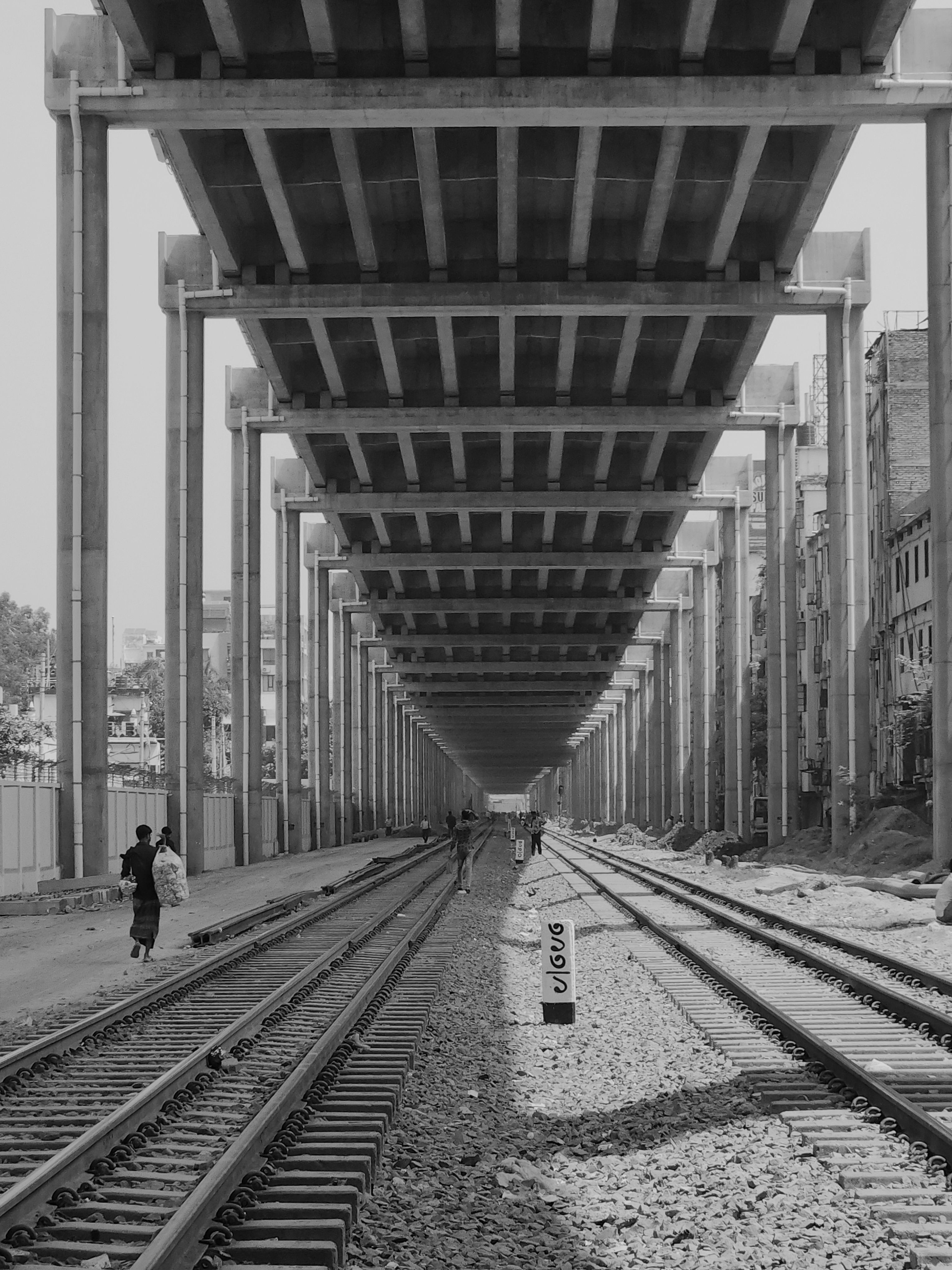 Photography of Rail Line Under flyover Bridge · Free Stock Photo