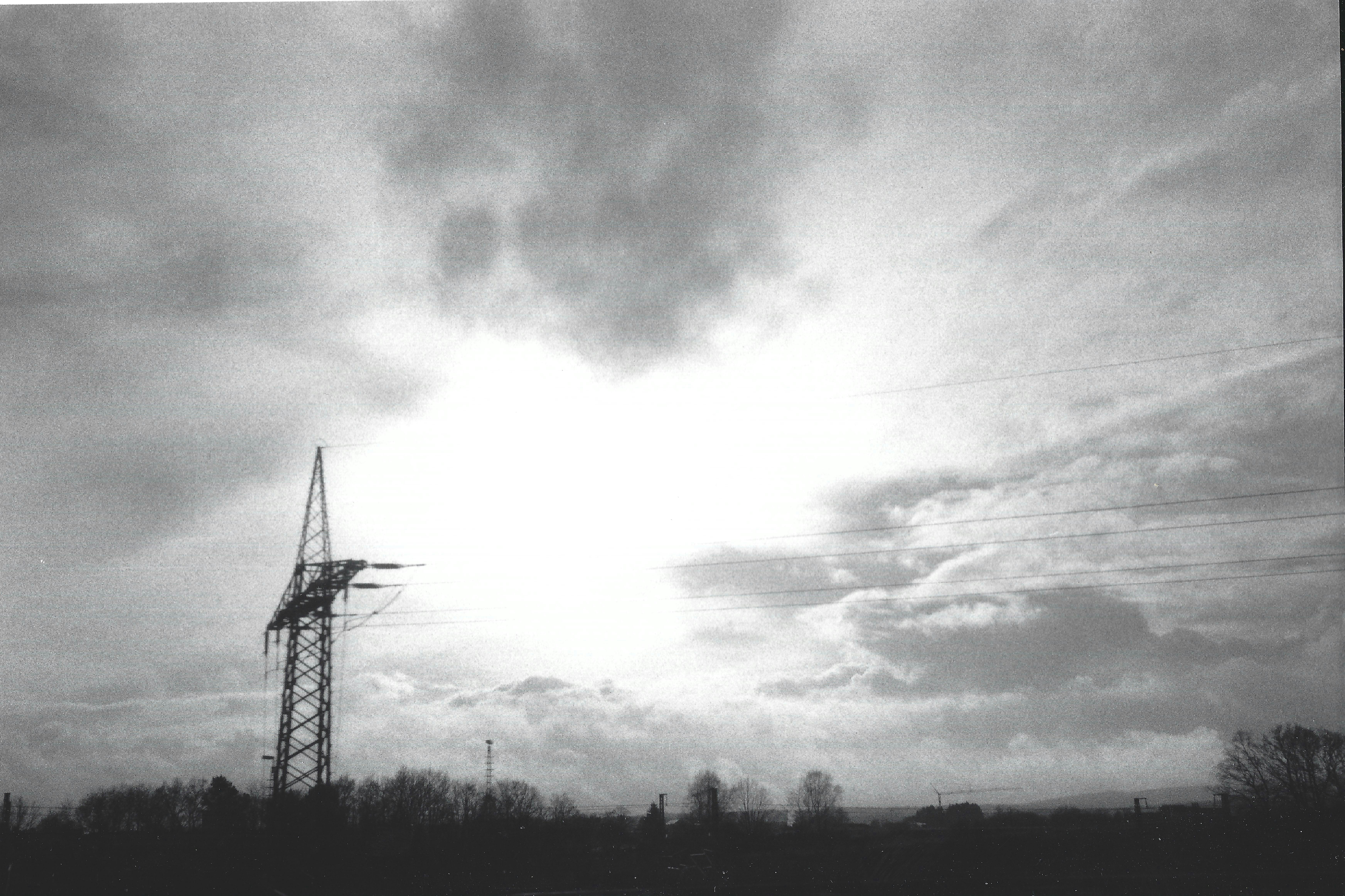 Final Electricity Pylon Against the Gray Sky · Free Stock Photo
