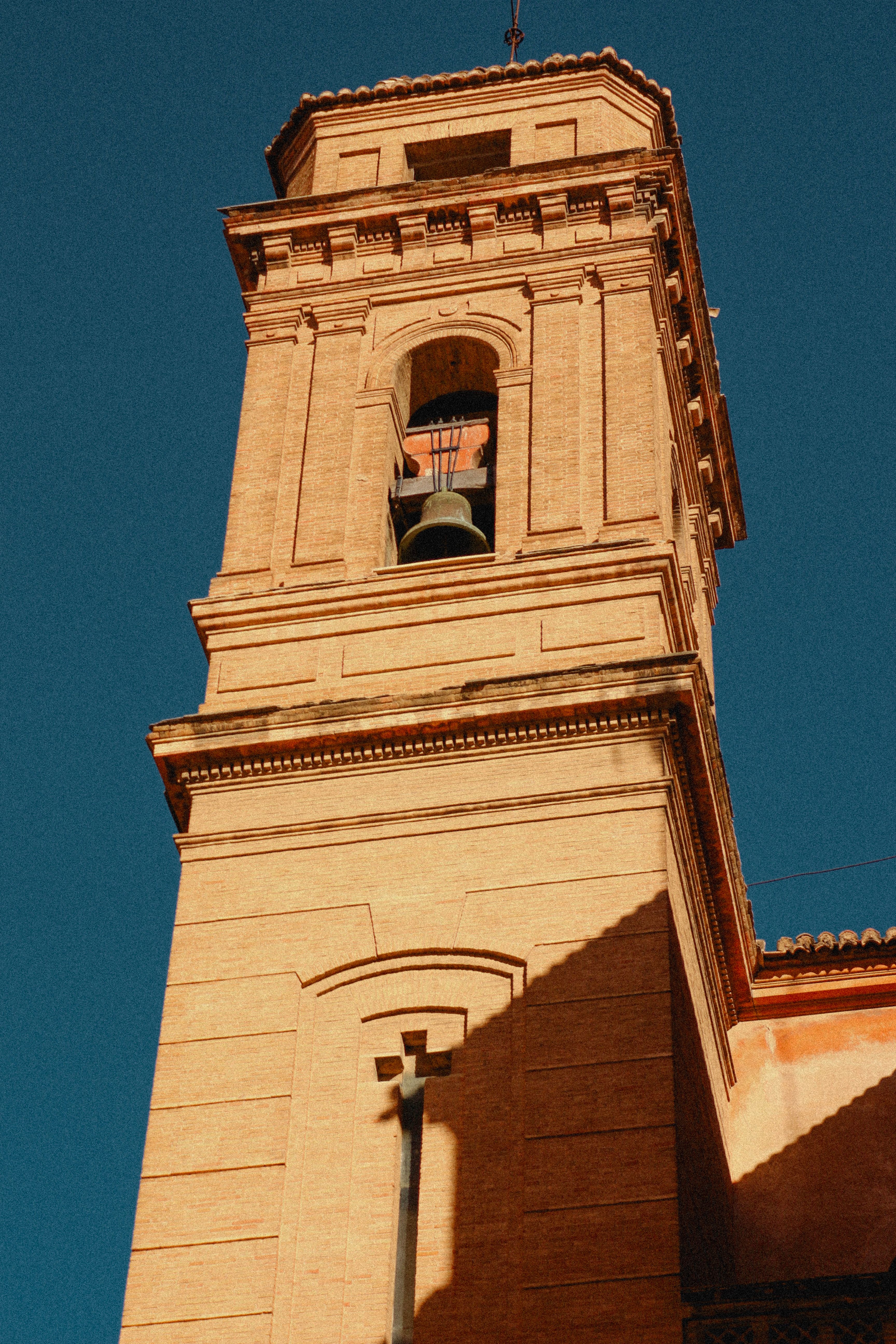 Facade of the Churchs Bell Tower · Free Stock Photo