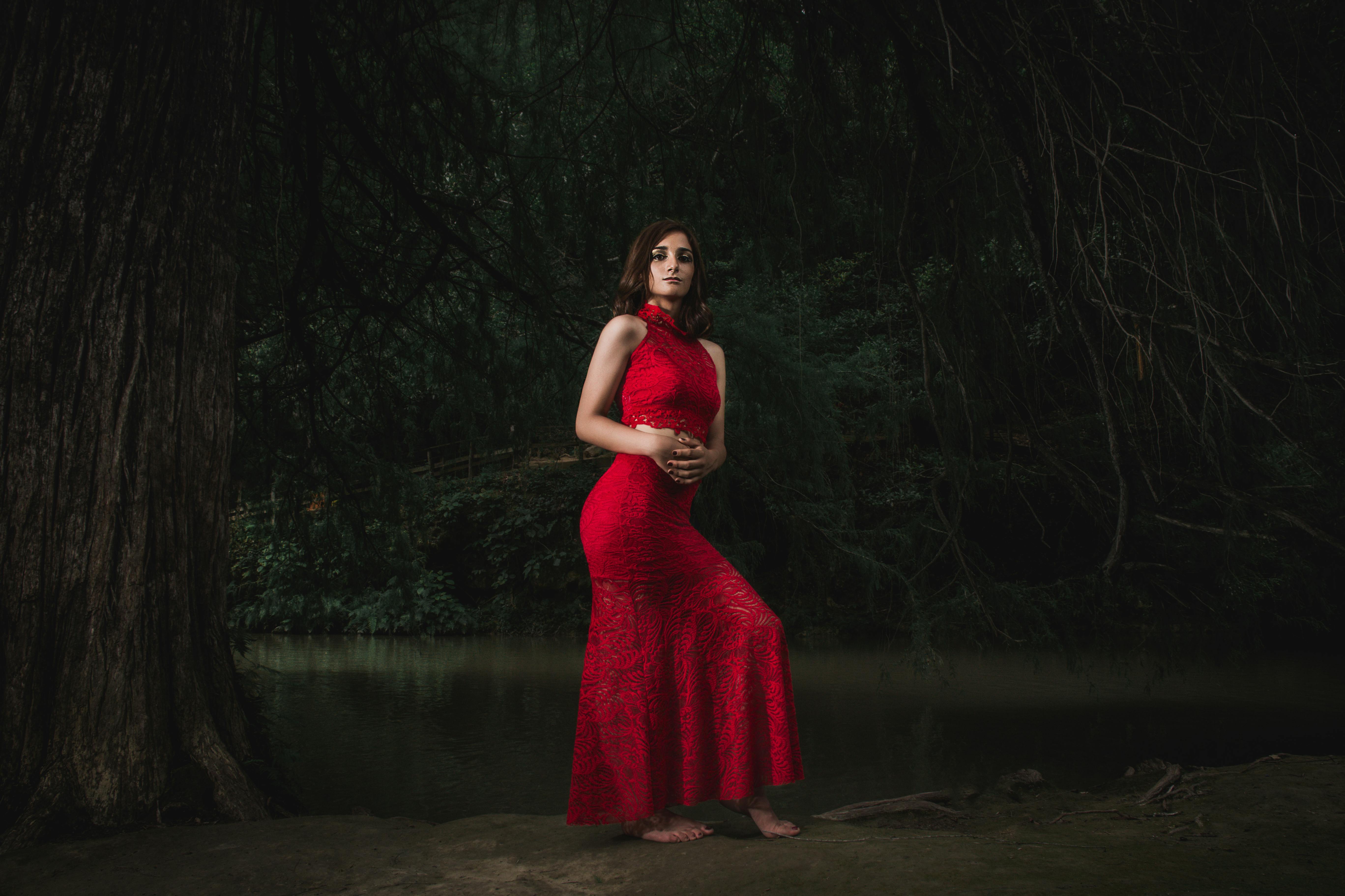 Woman Standing Under Green Tree · Free Stock Photo