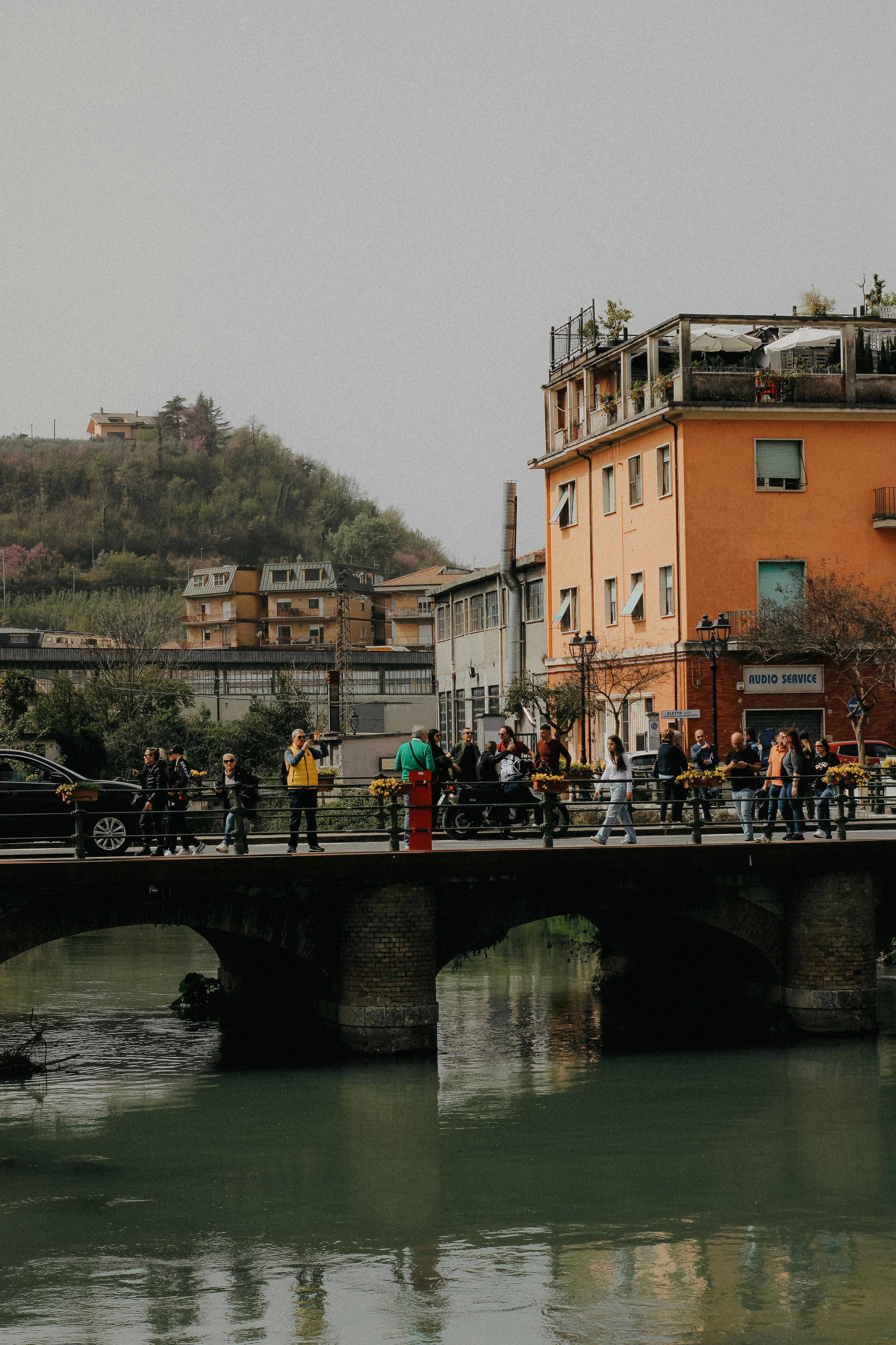 People on the Arch Bridge · Free Stock Photo