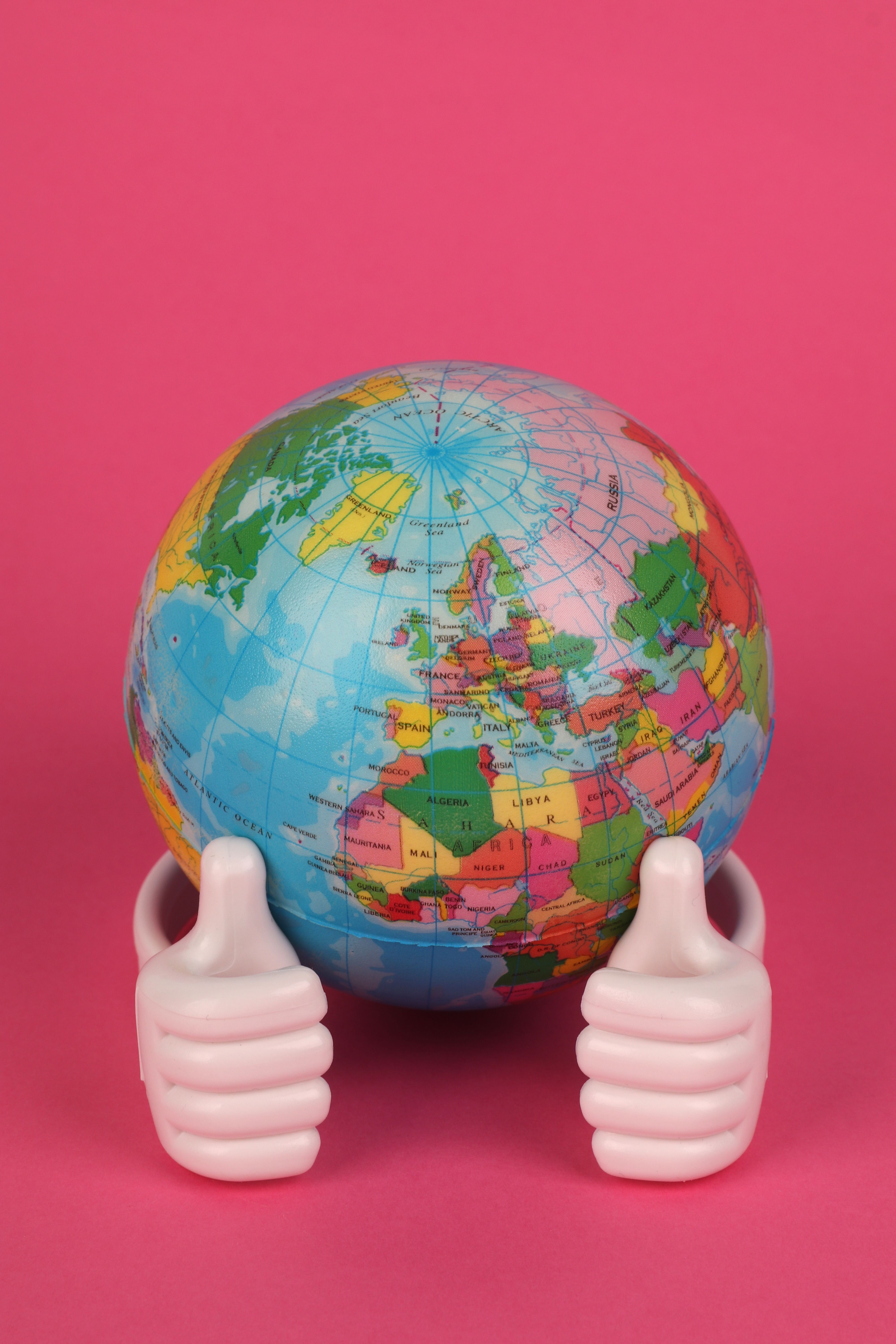 Globe Figurine in a Studio · Free Stock Photo
