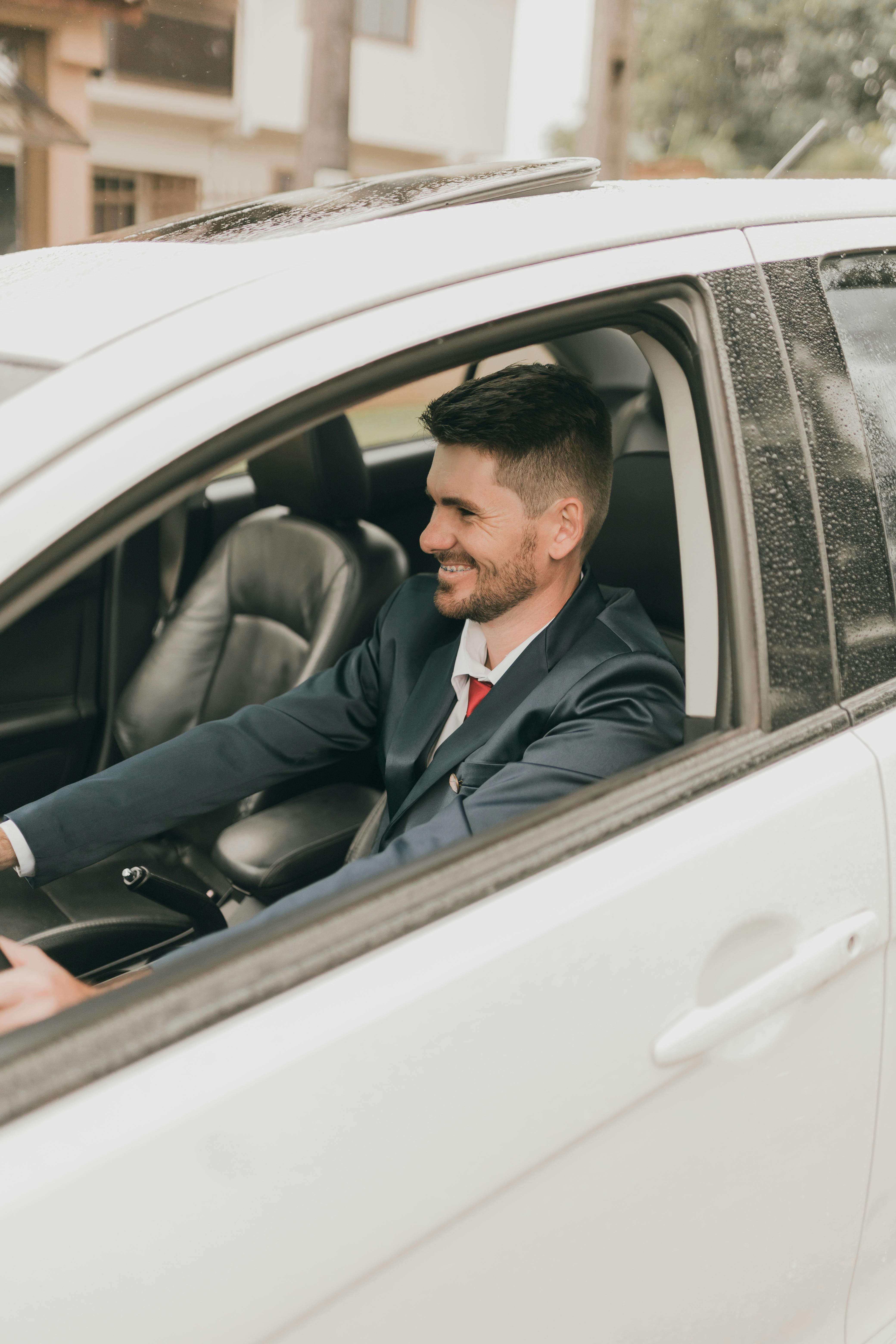 Man Driving a Car · Free Stock Photo