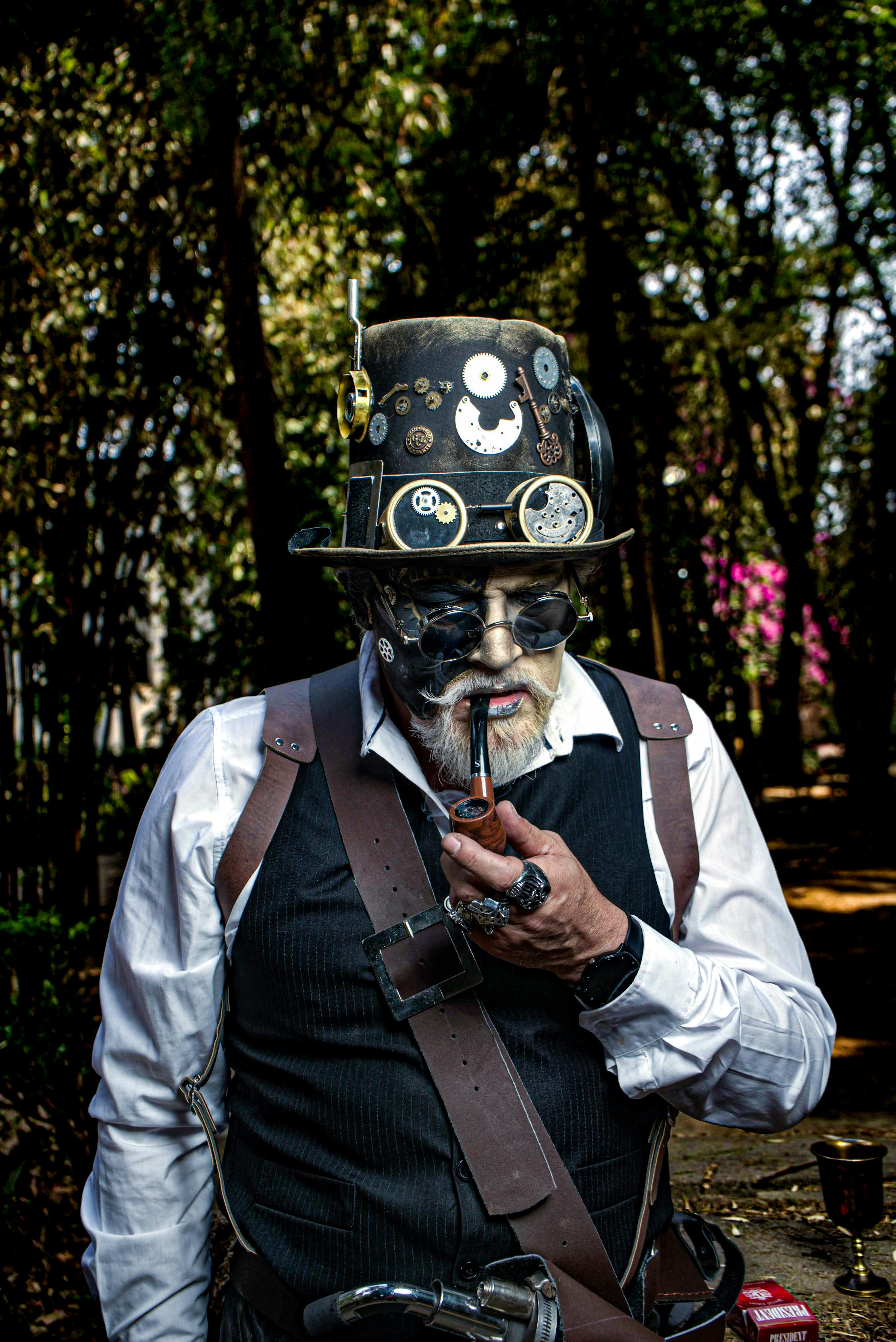 Steampunk Style Man Smoking Pipe in Summer · Free Stock Photo