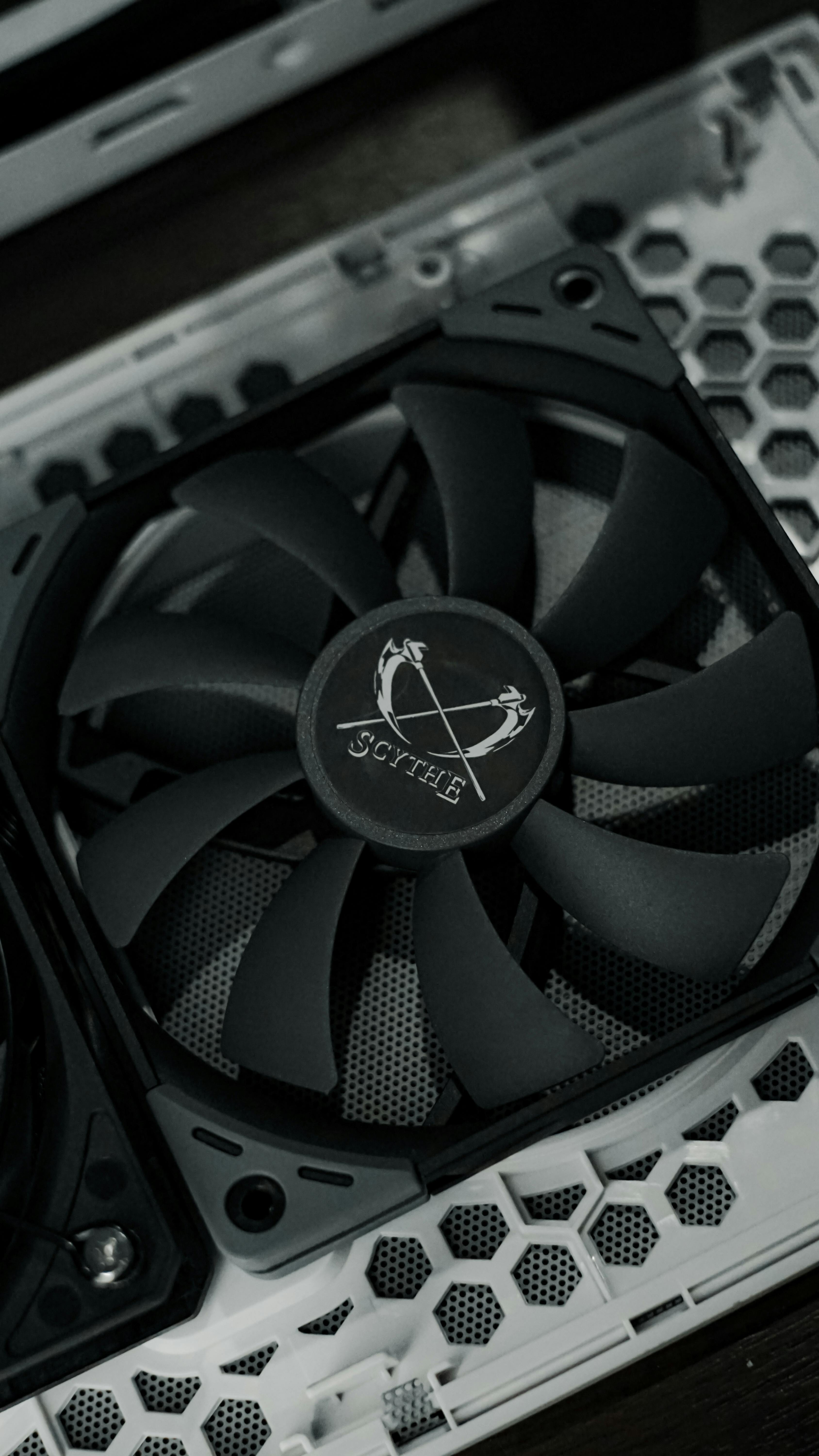 A close up of two fans on top of a computer · Free Stock Photo