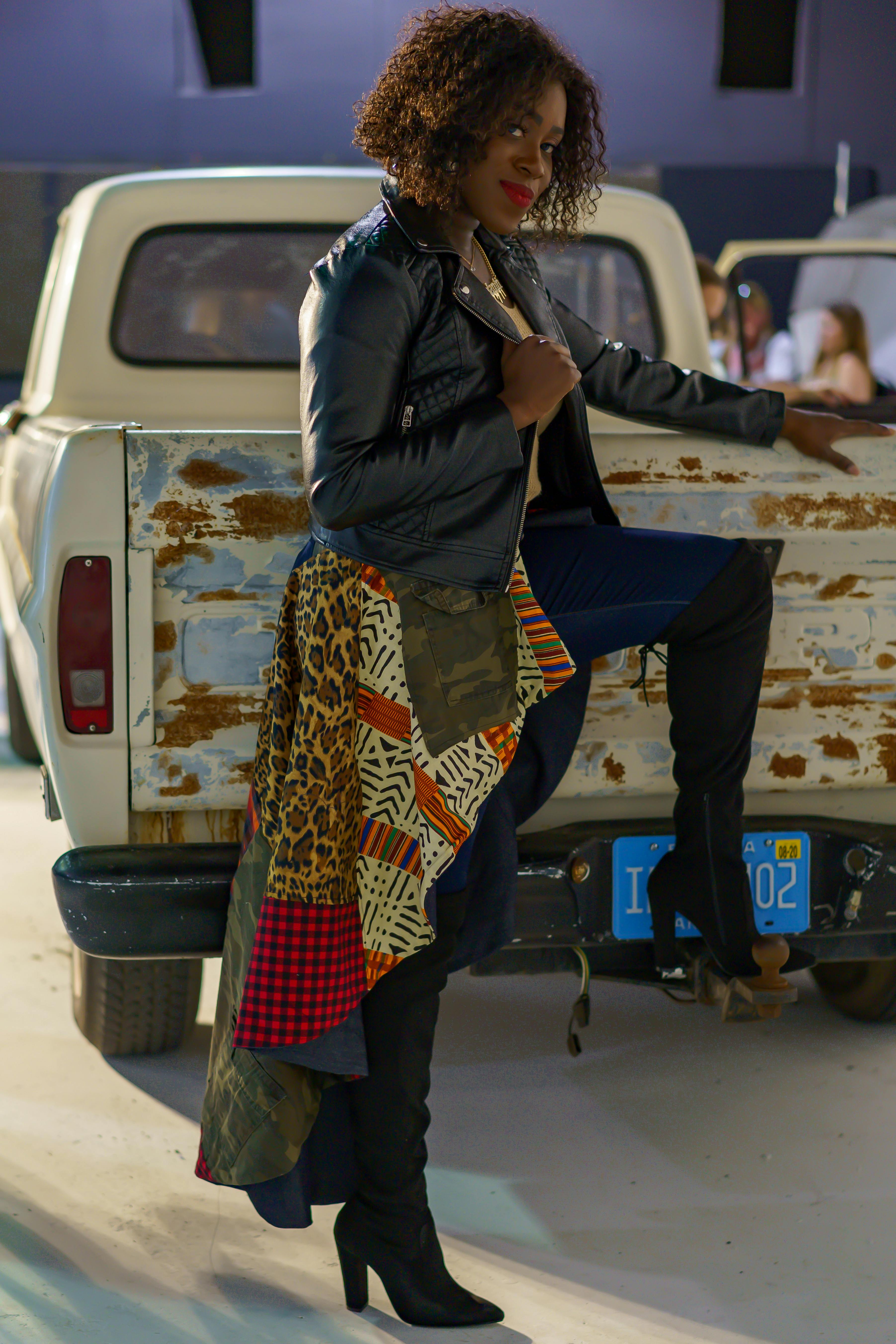 Woman Leaning Against a Pick-up Truck with her Leg up · Free Stock Photo