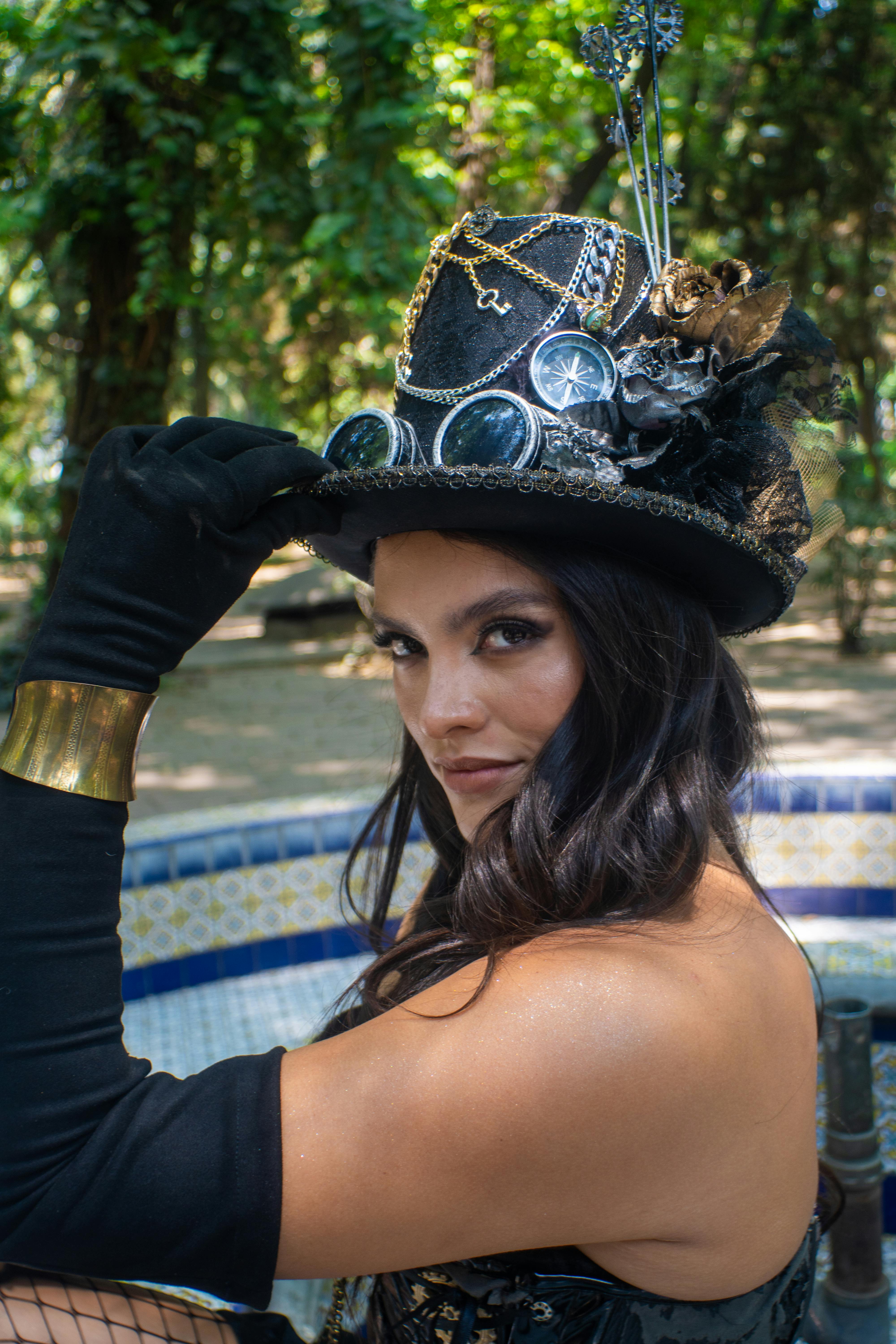 A Woman in a Steampunk Costume Posing Outside · Free Stock Photo