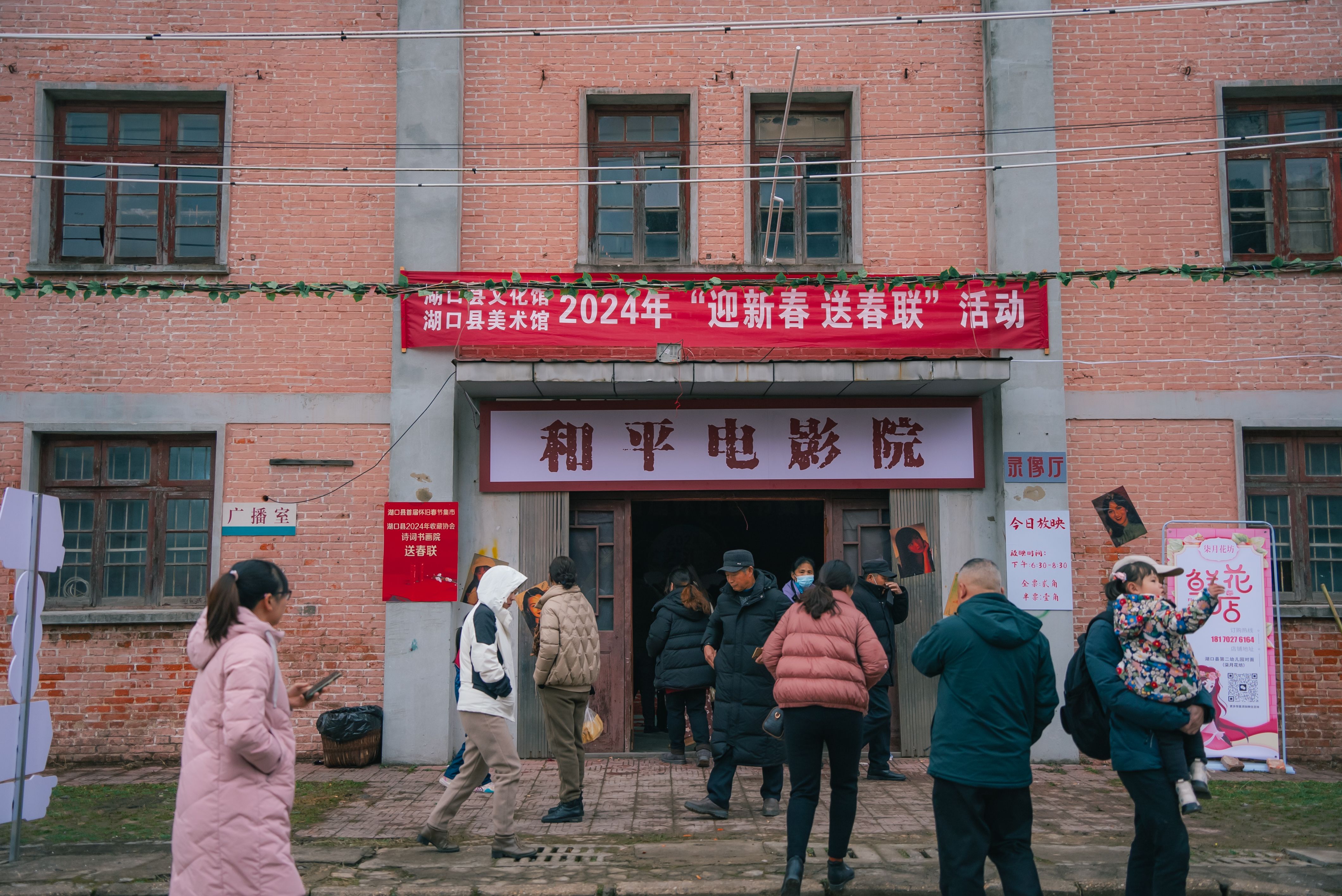 People Gathered Around a Building · Free Stock Photo