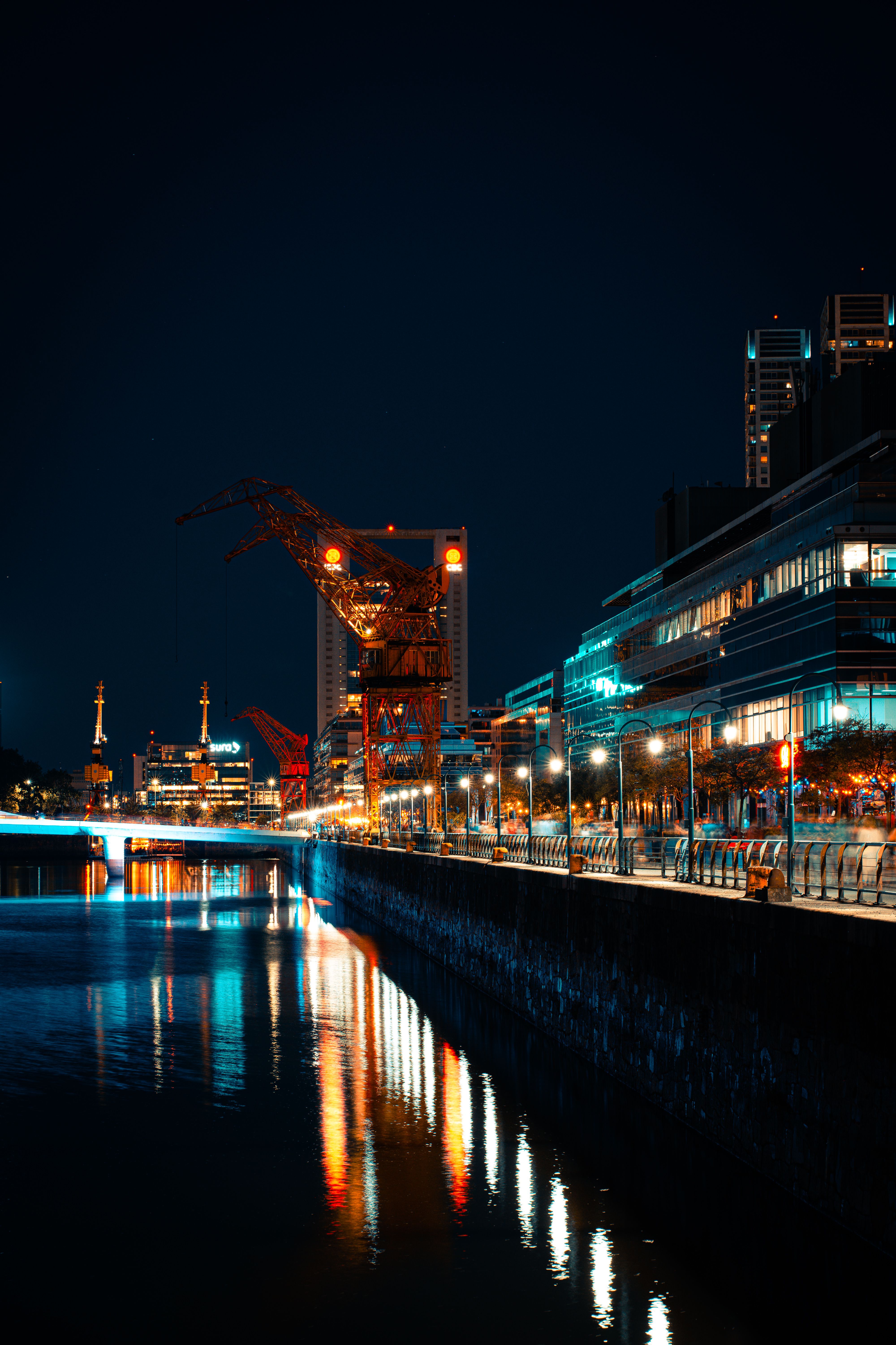 A night time view of a city with a bridge · Free Stock Photo