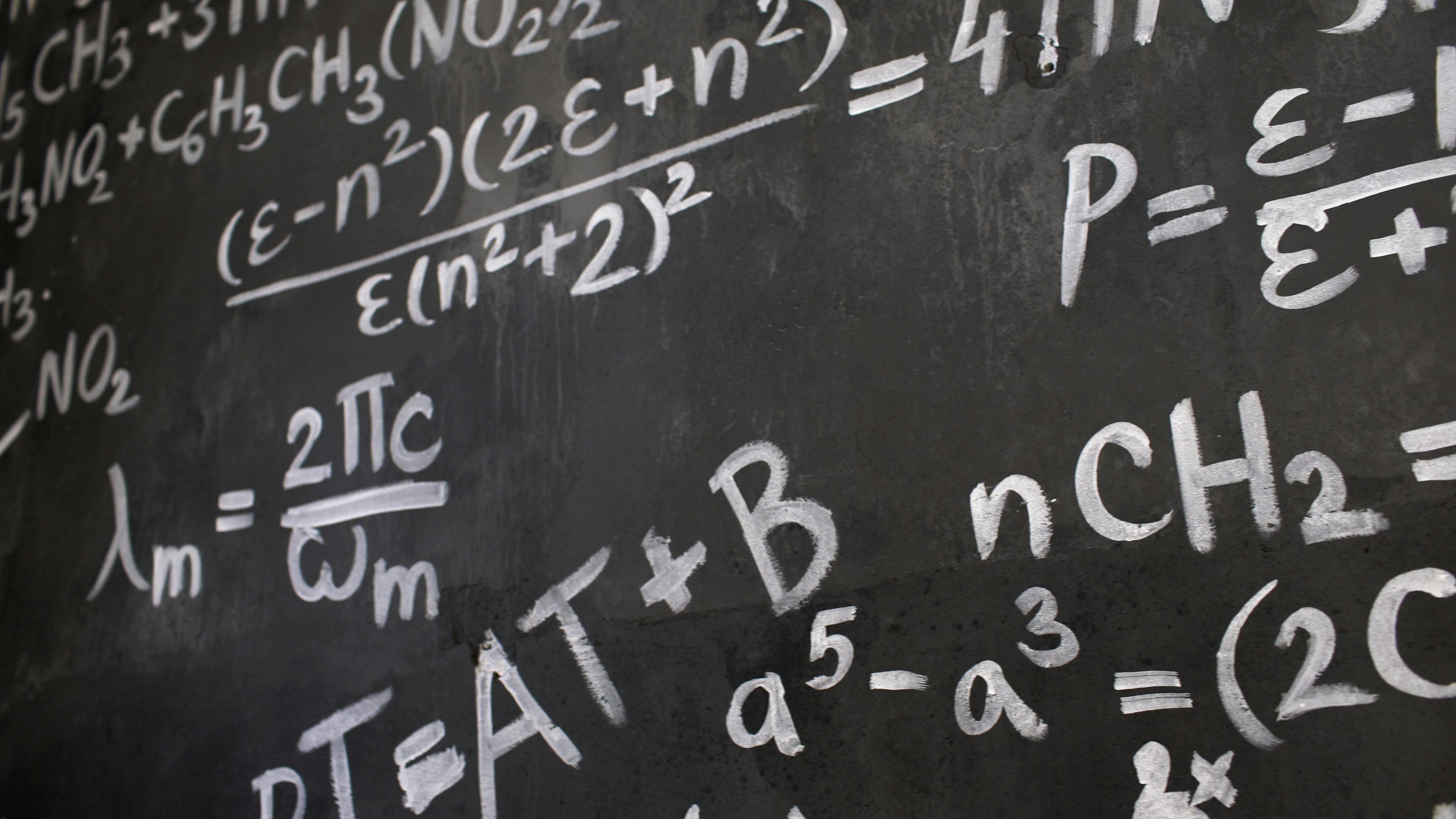 Close-up of Complicated Equations Written on a Blackboard · Free Stock Photo