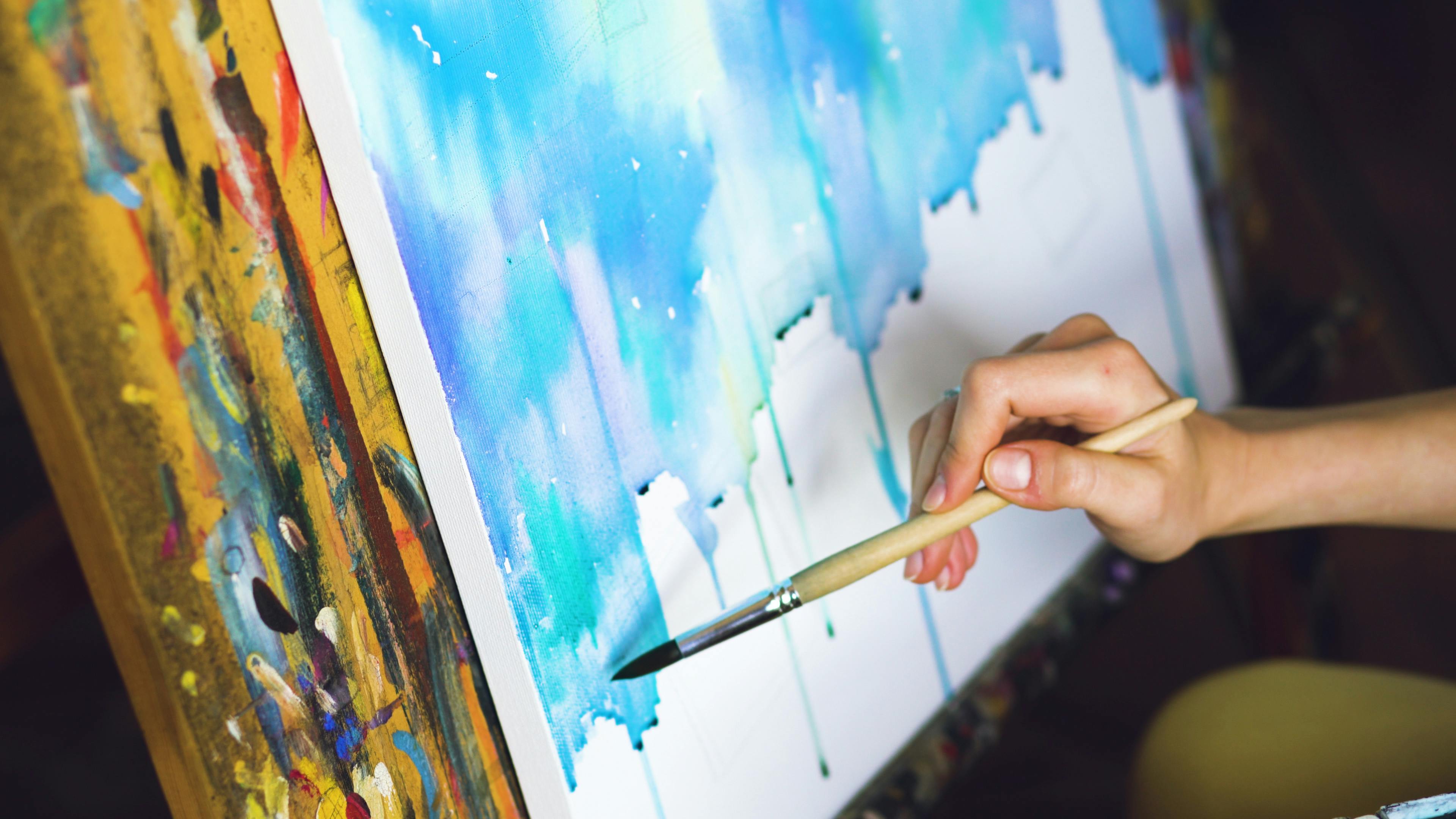 Person Painting with Blue Watercolor Paint · Free Stock Photo