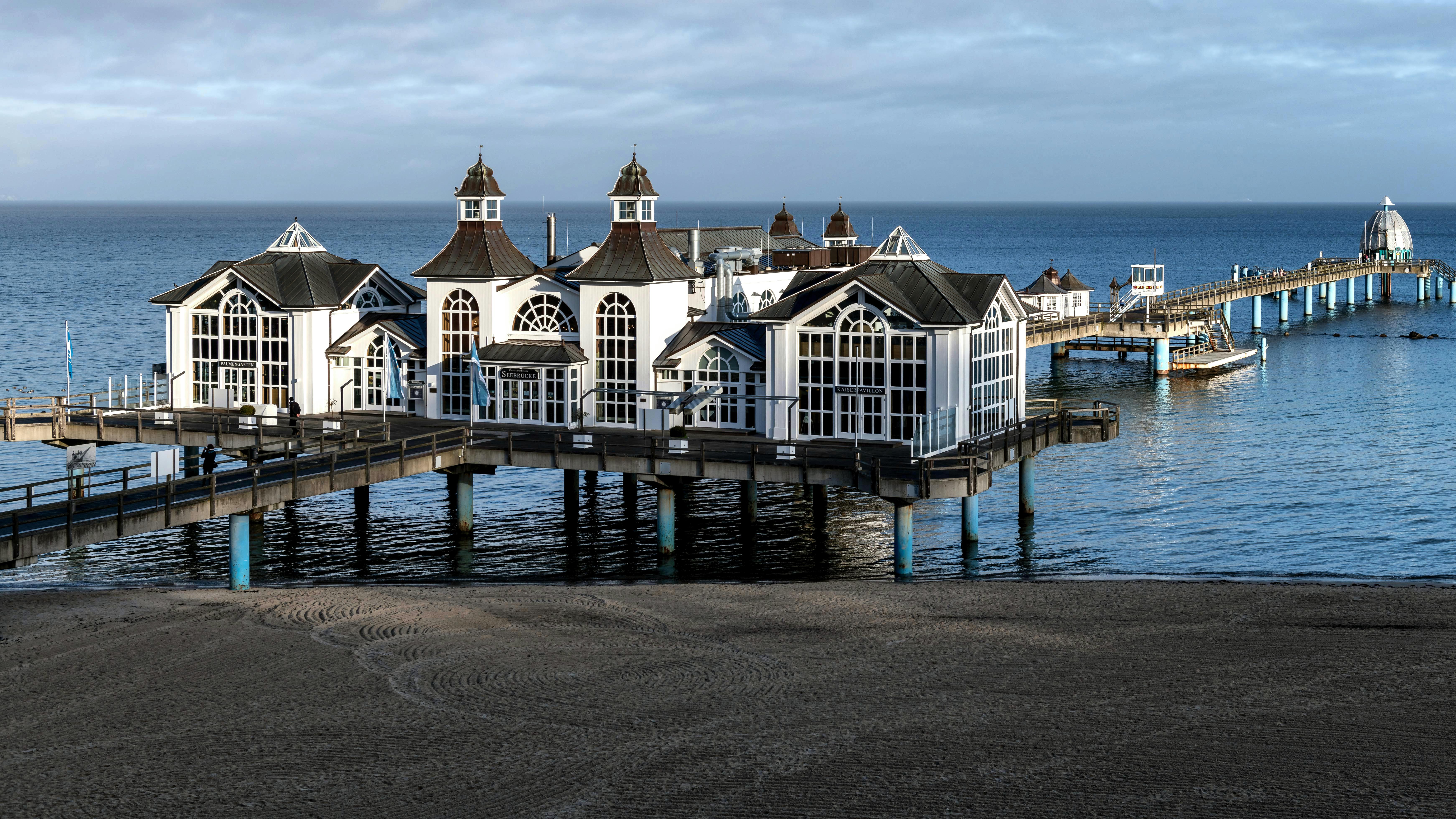 Large Building with Tall Windows Built on a Pier over Sea · Free Stock ...