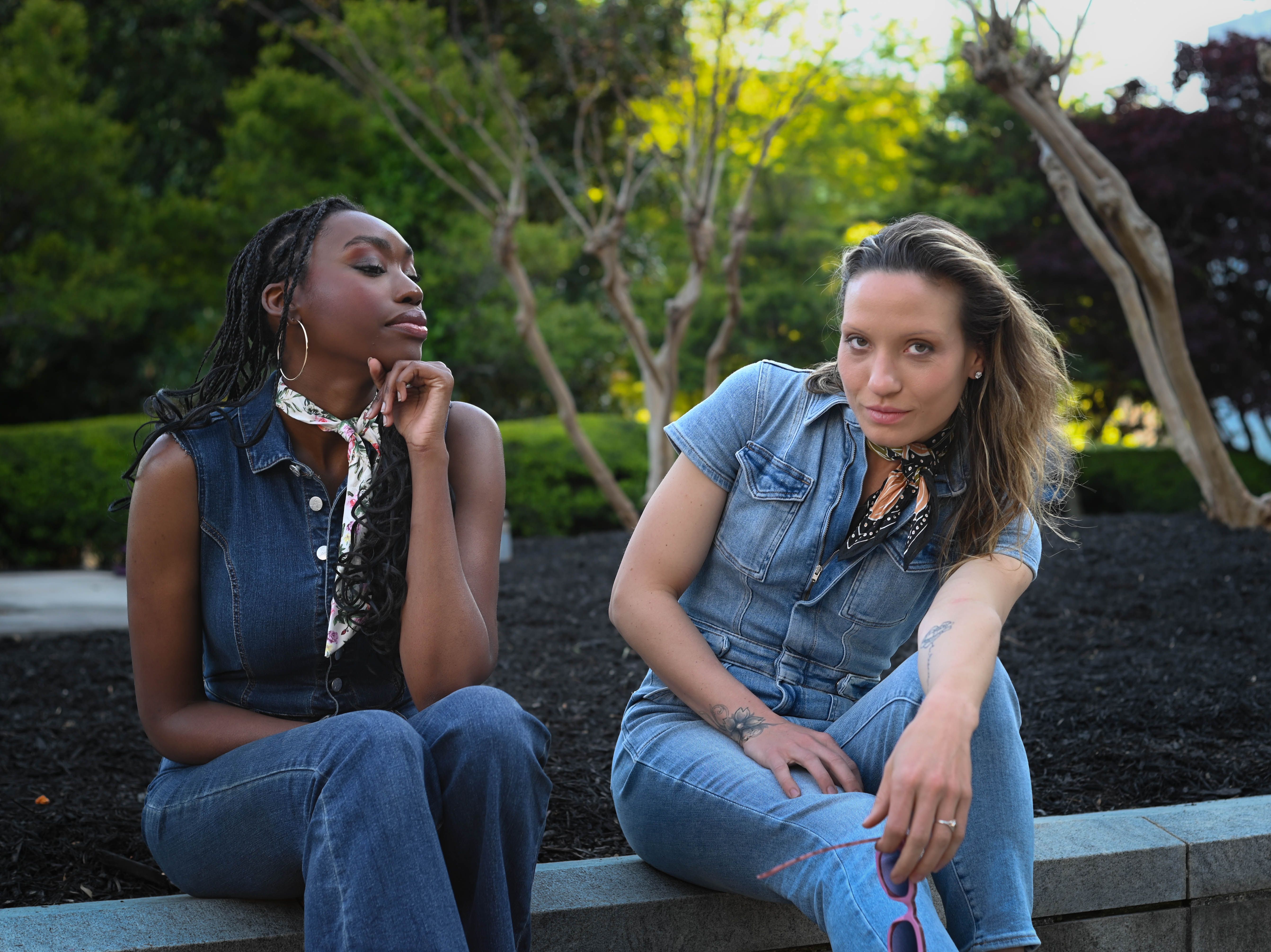 Women Sitting on Wall at Park · Free Stock Photo