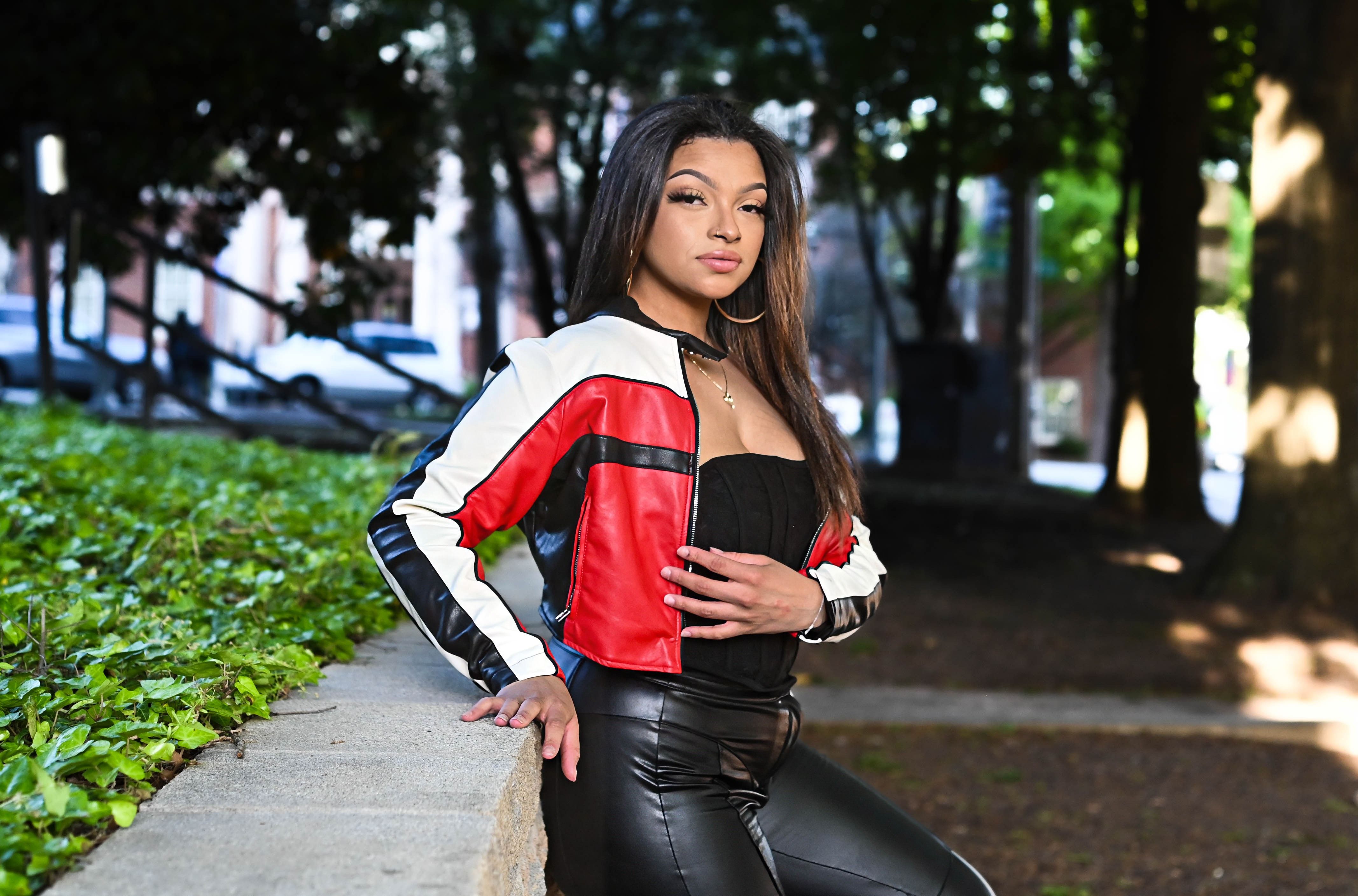 Brunette Woman in Leather Jacket · Free Stock Photo