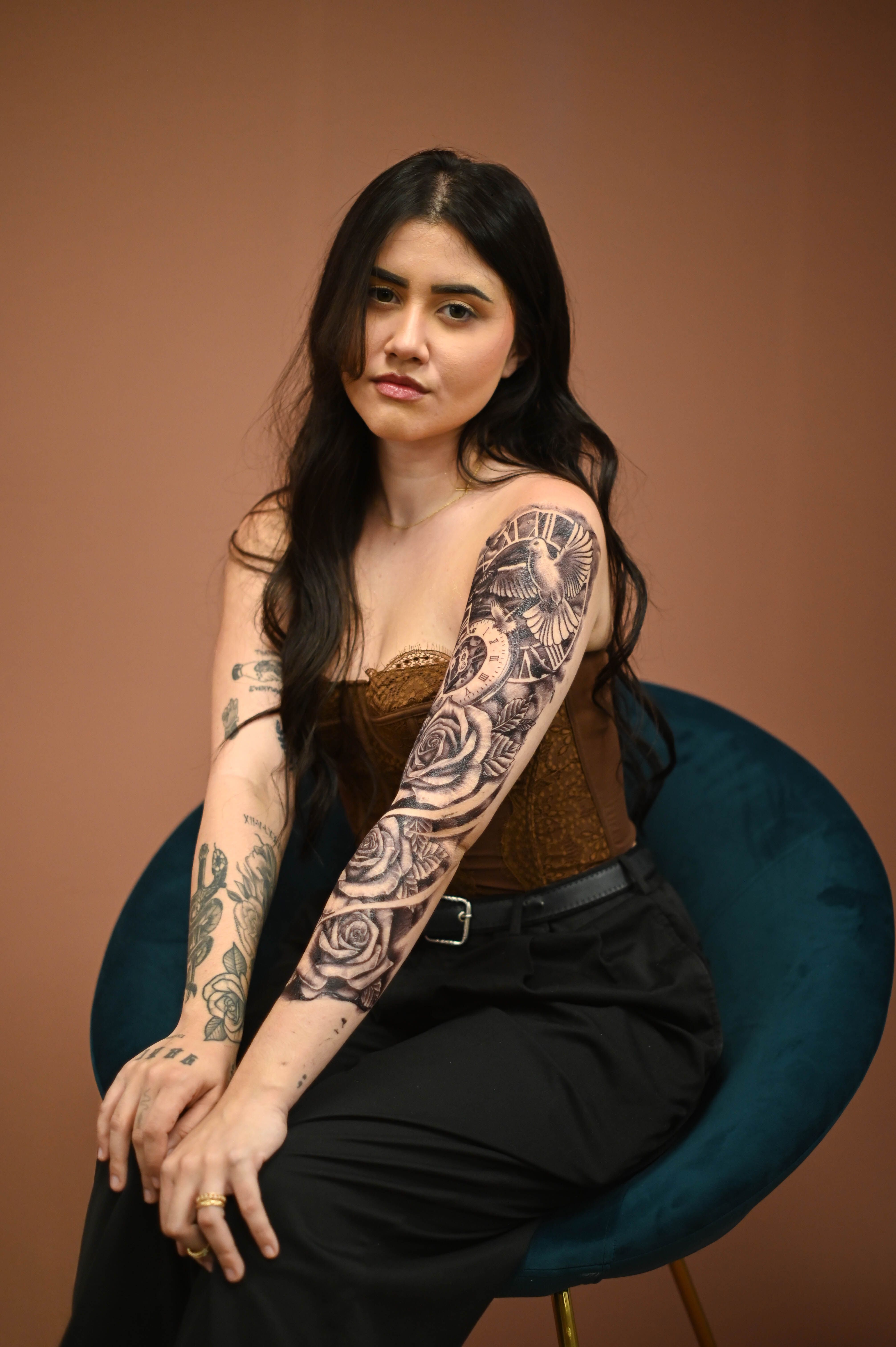 Studio Shot of a Young Woman with Tattoos · Free Stock Photo
