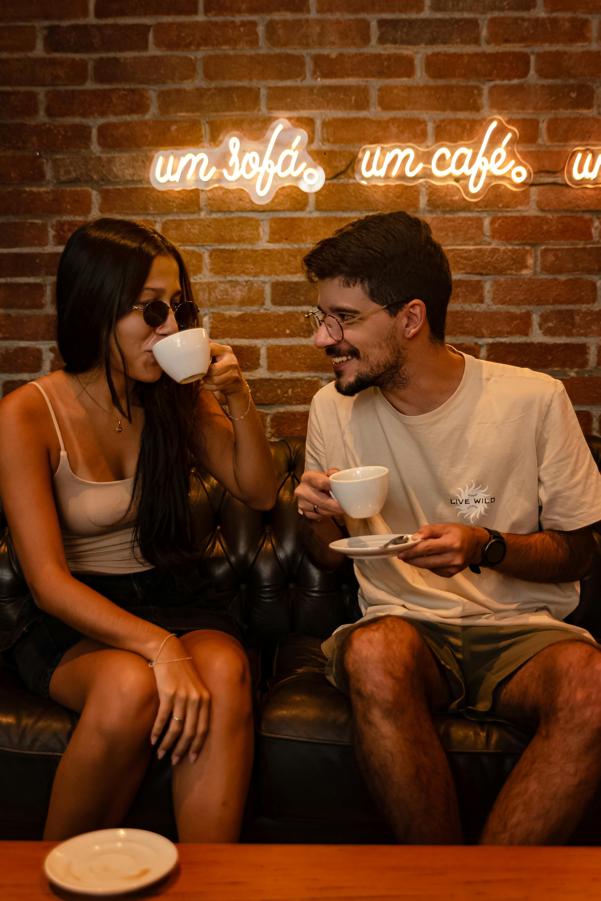Couple Talking Over Coffee · Free Stock Photo