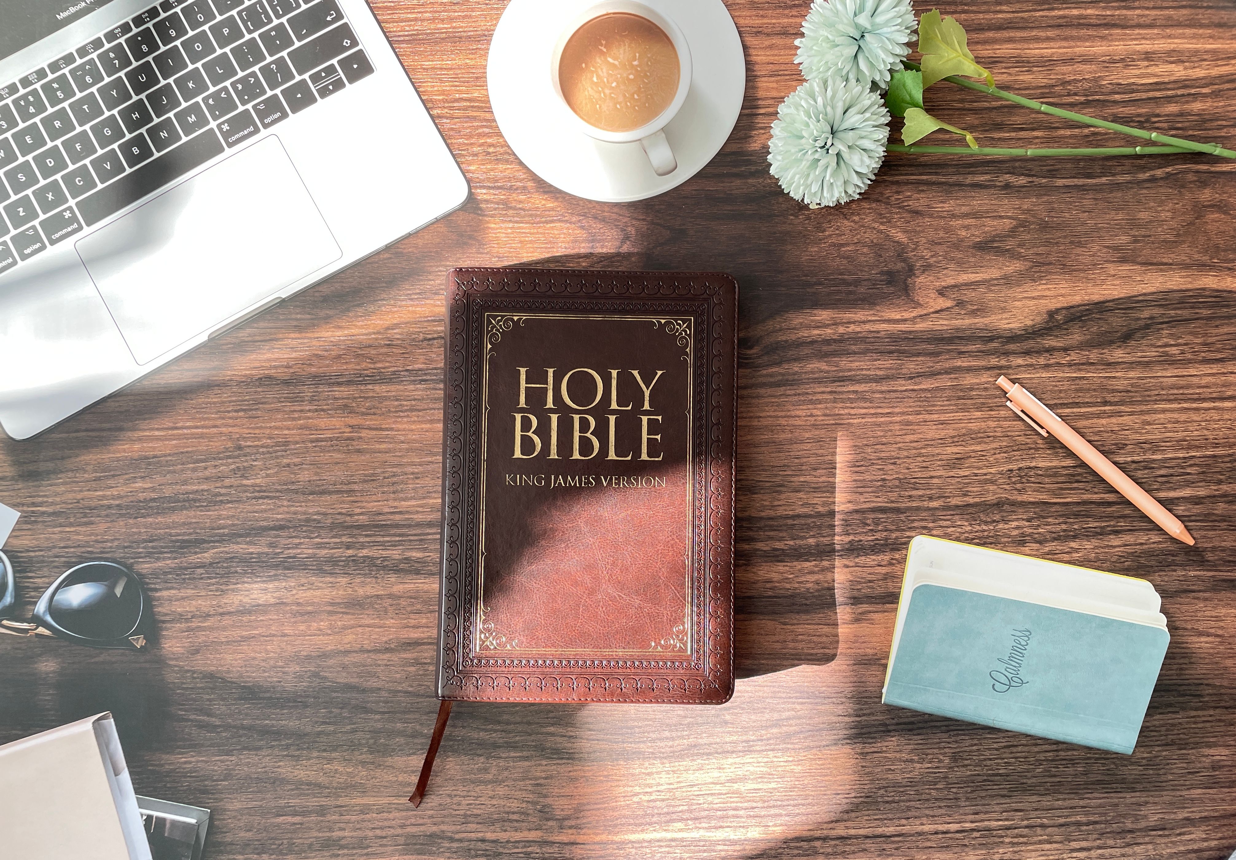 Flat Lay of the Holy Bible and Items on the Desk · Free Stock Photo