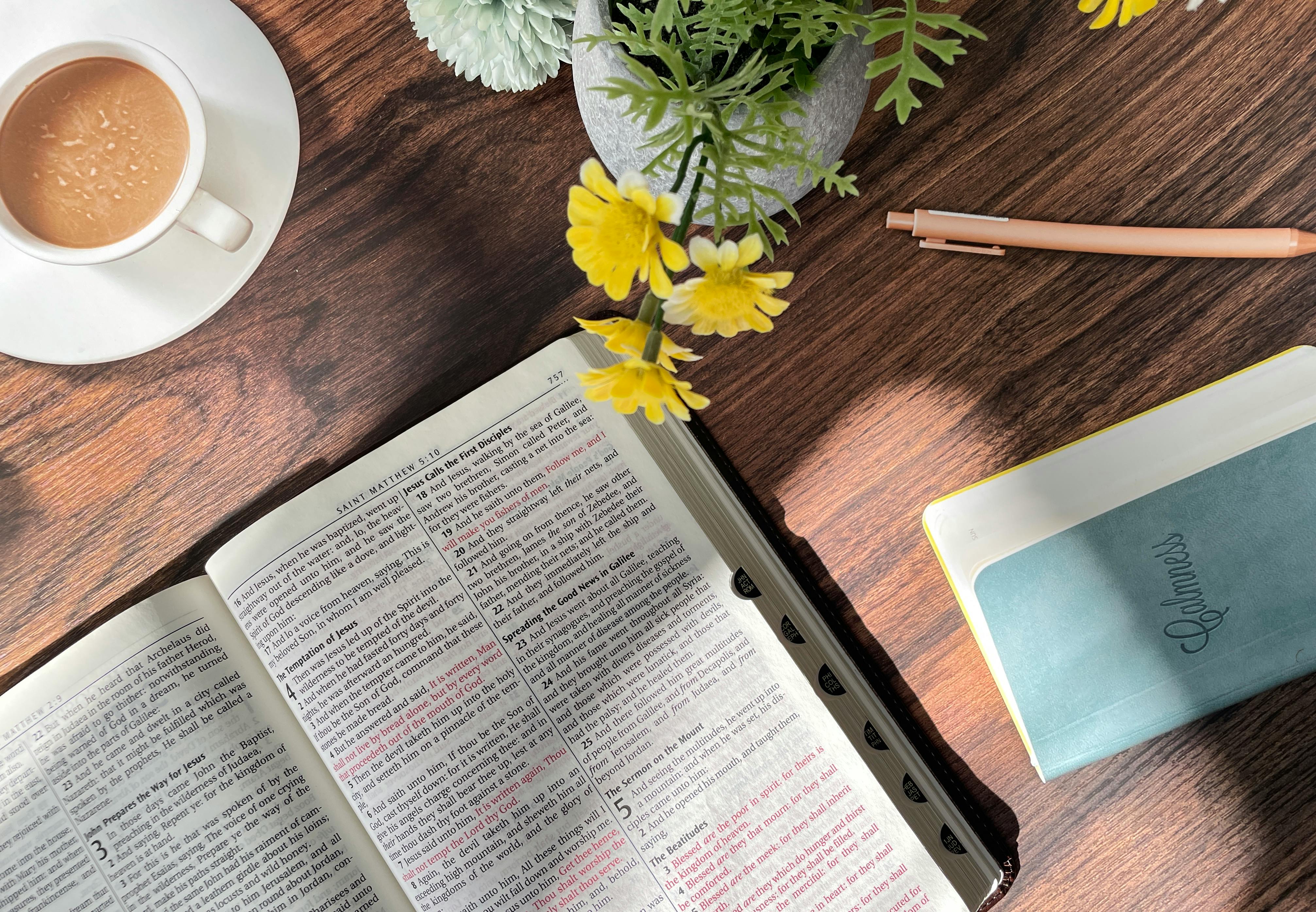 Top View of the Bible Lying on a Table · Free Stock Photo