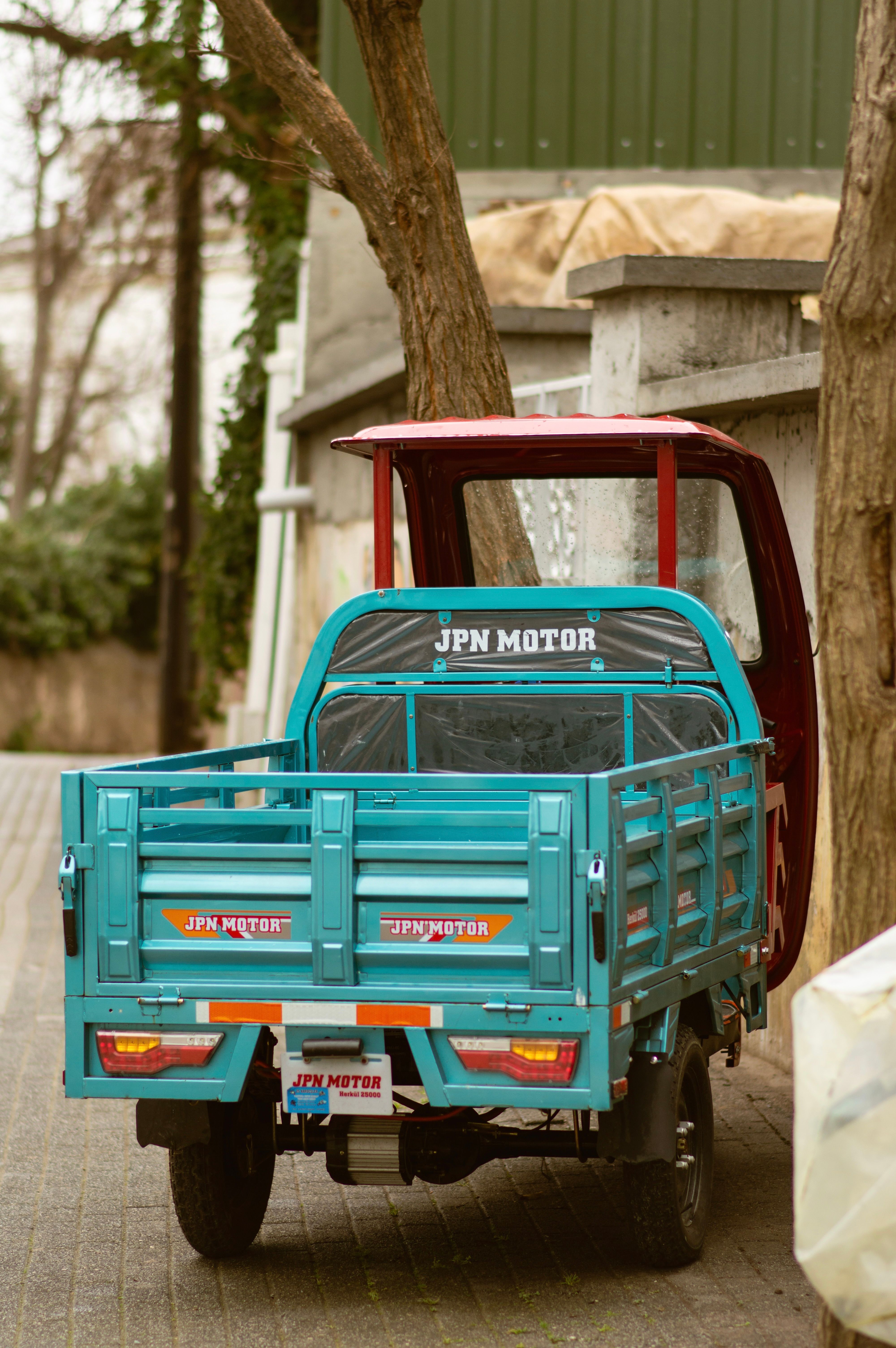 Blue Three-wheeler Truck · Free Stock Photo