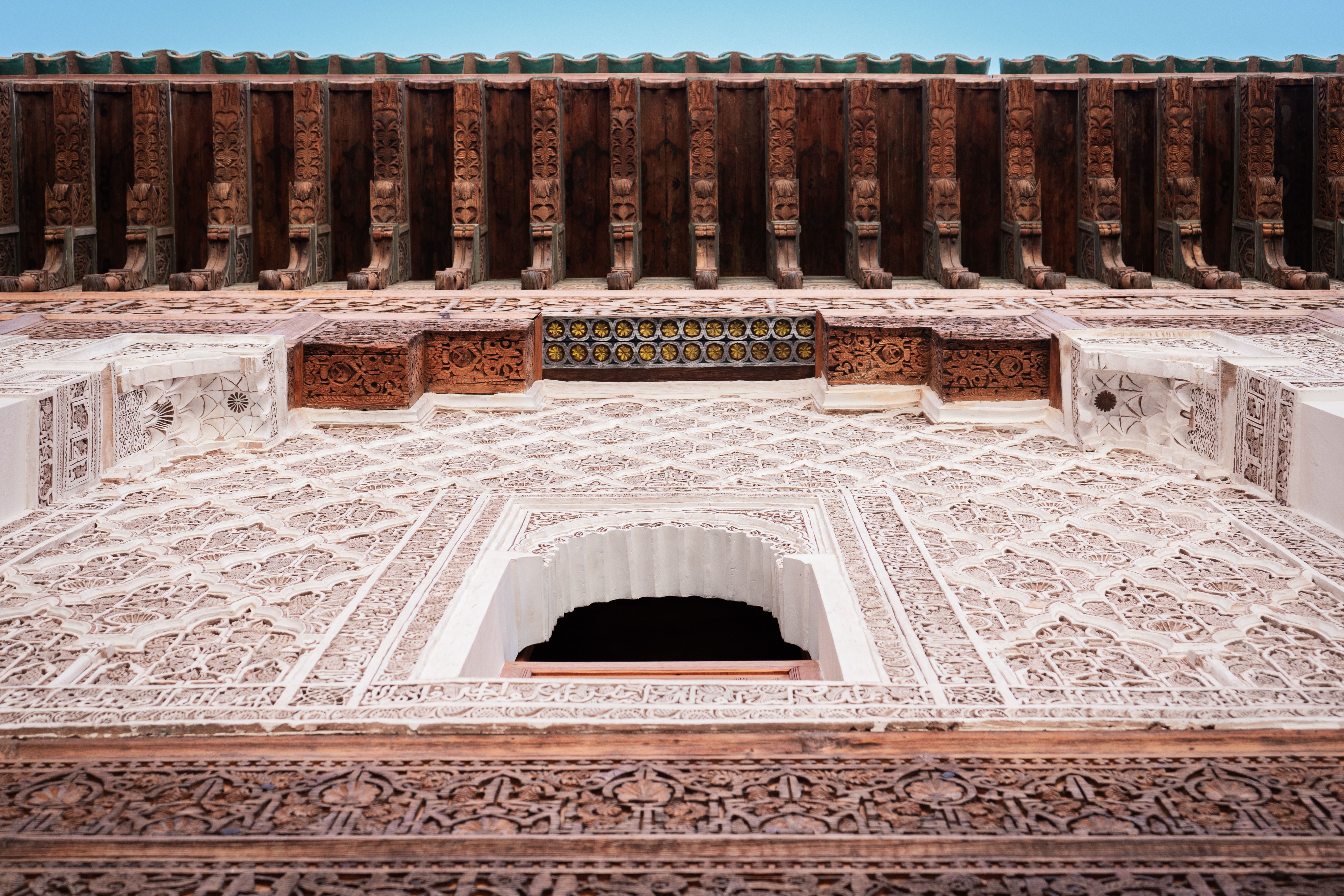 Low Angle Shot of the Ornate Facade of Ben Youssef Madrasa · Free Stock ...